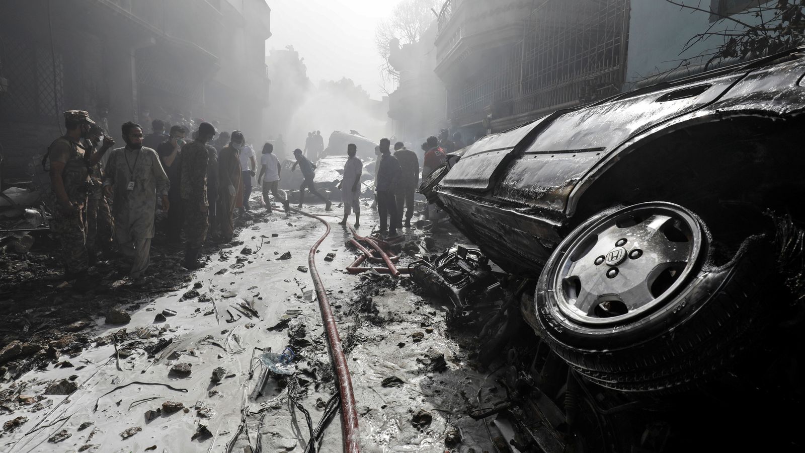 Pakistan plane crash: At least two survivors after aircraft carrying 98 ...