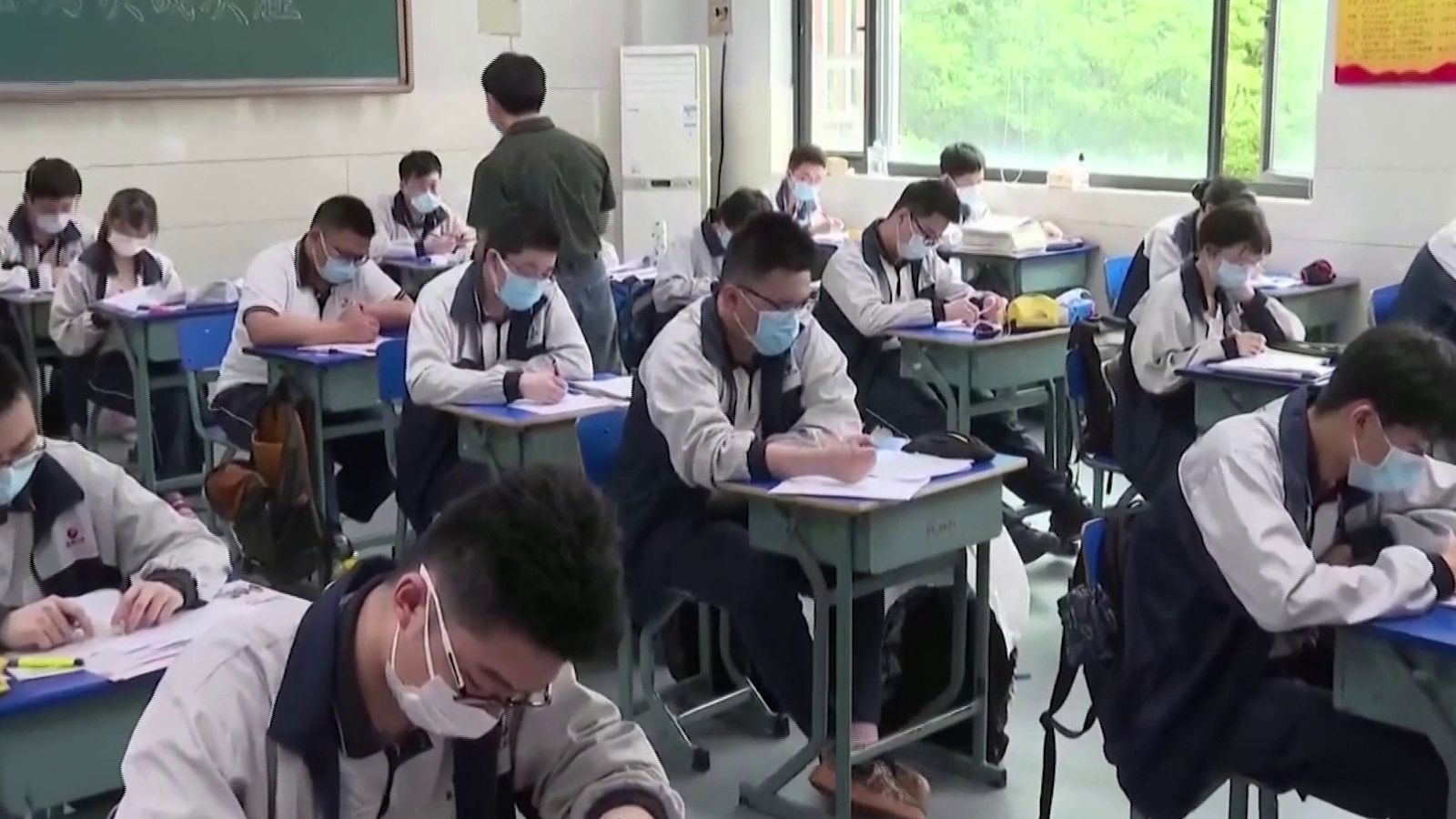 Coronavirus: Students head back to school in Wuhan | World News | Sky News