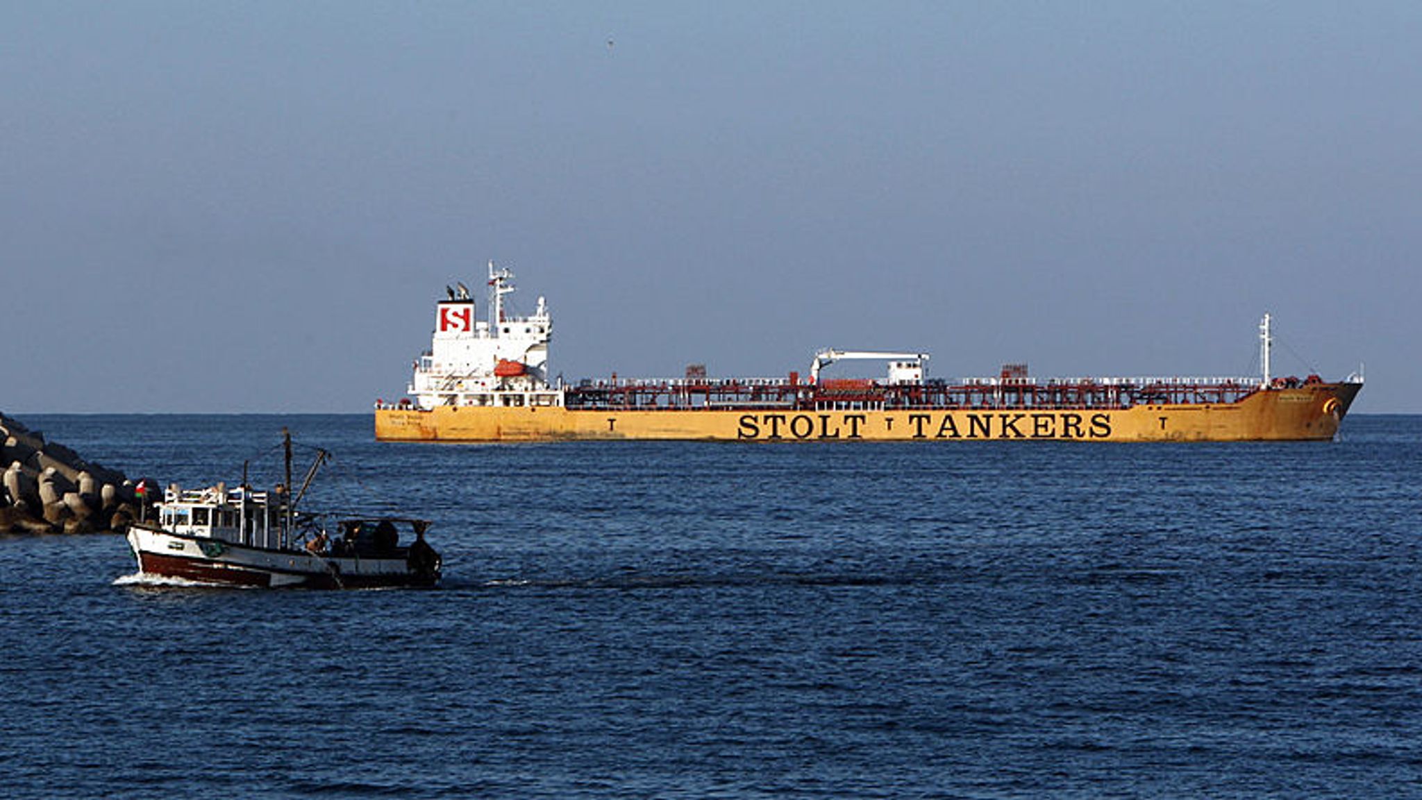 Pirates attack UK-flagged oil tanker with gunfire | UK News | Sky News