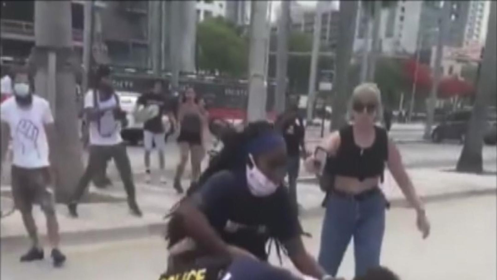 Police and anti-racism protesters clash in Miami | World News | Sky News