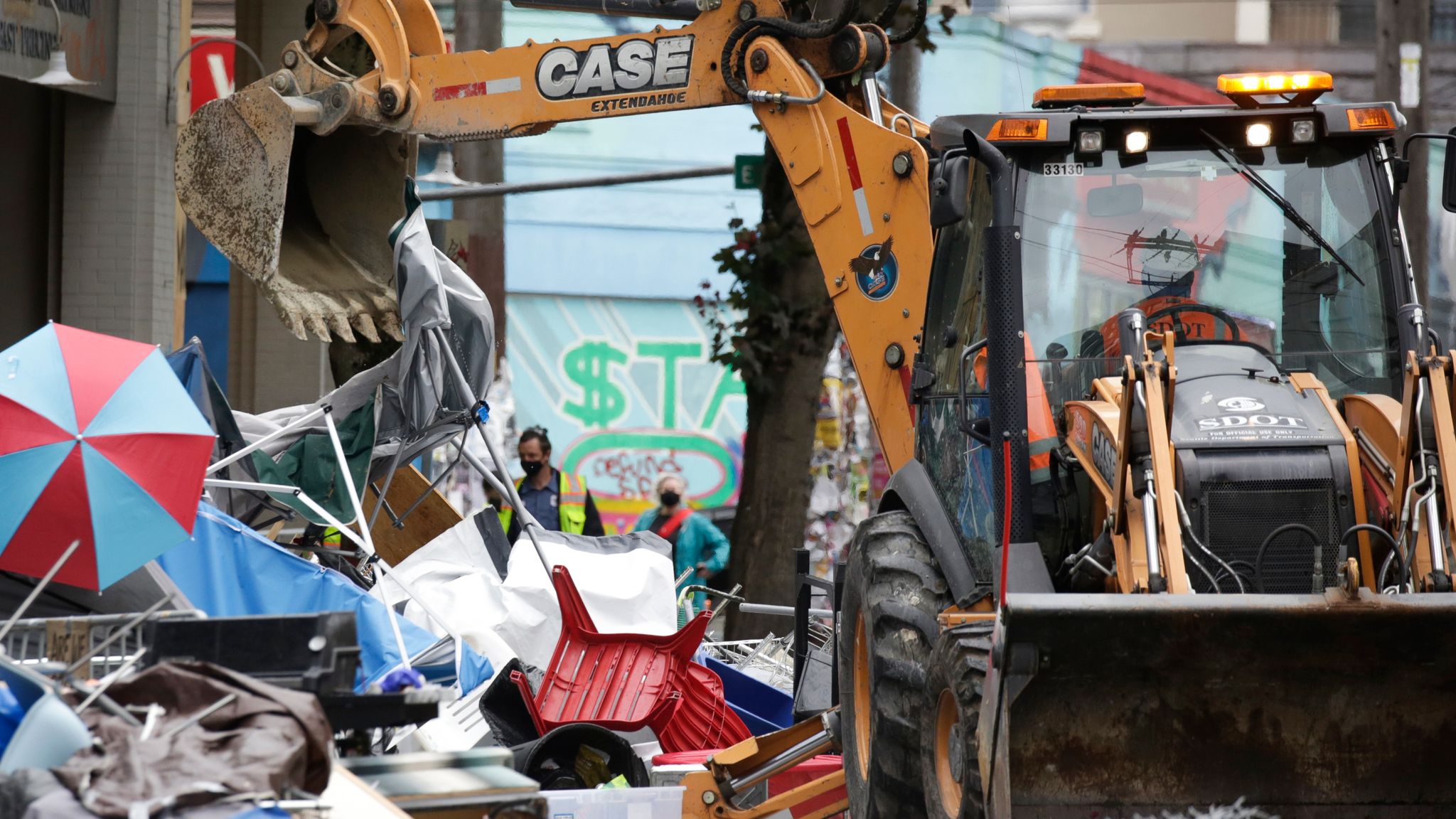 Seattle's 'lawless' protest zone cleared in dawn raids after two fatal ...