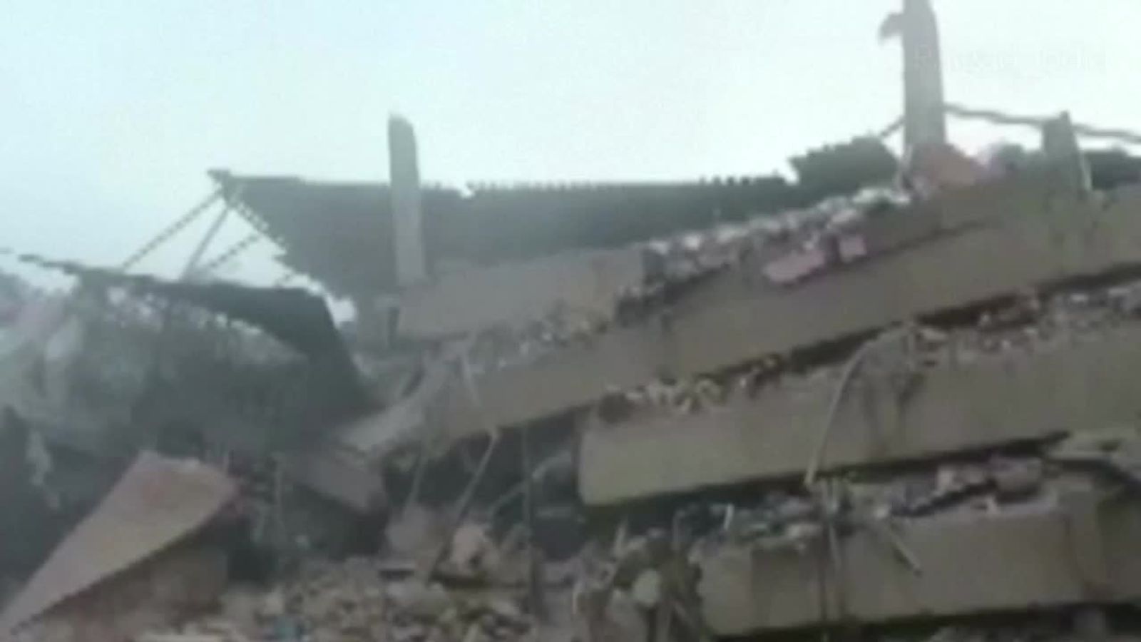 Dozens feared trapped after building collapses in India | World News ...