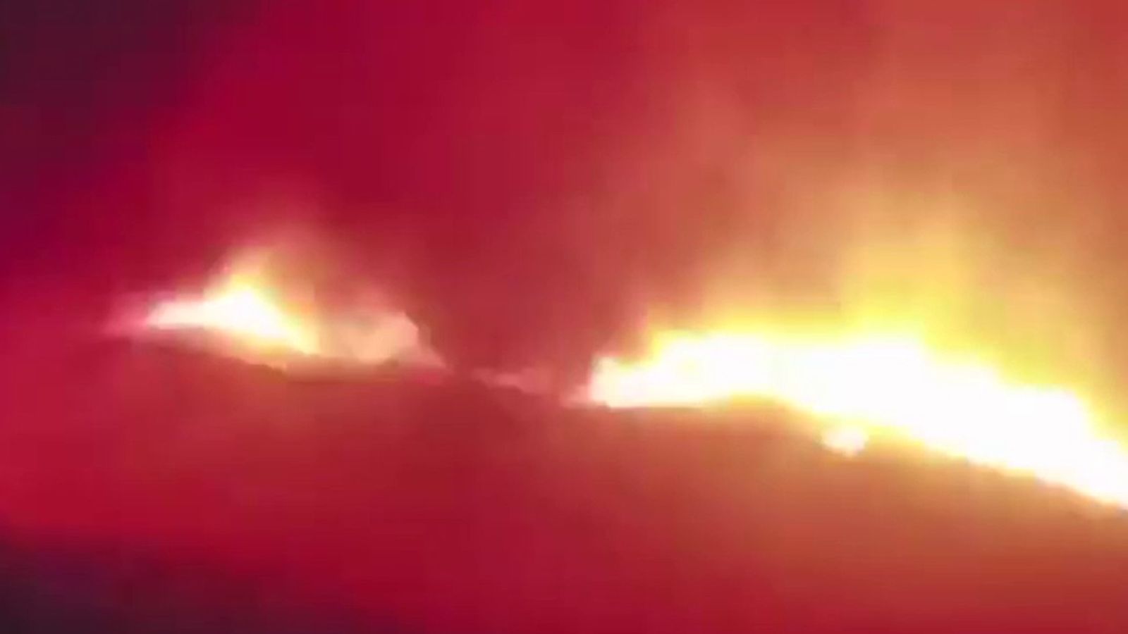 Watch as wildfire gets nearer and nearer to camera | US News | Sky News