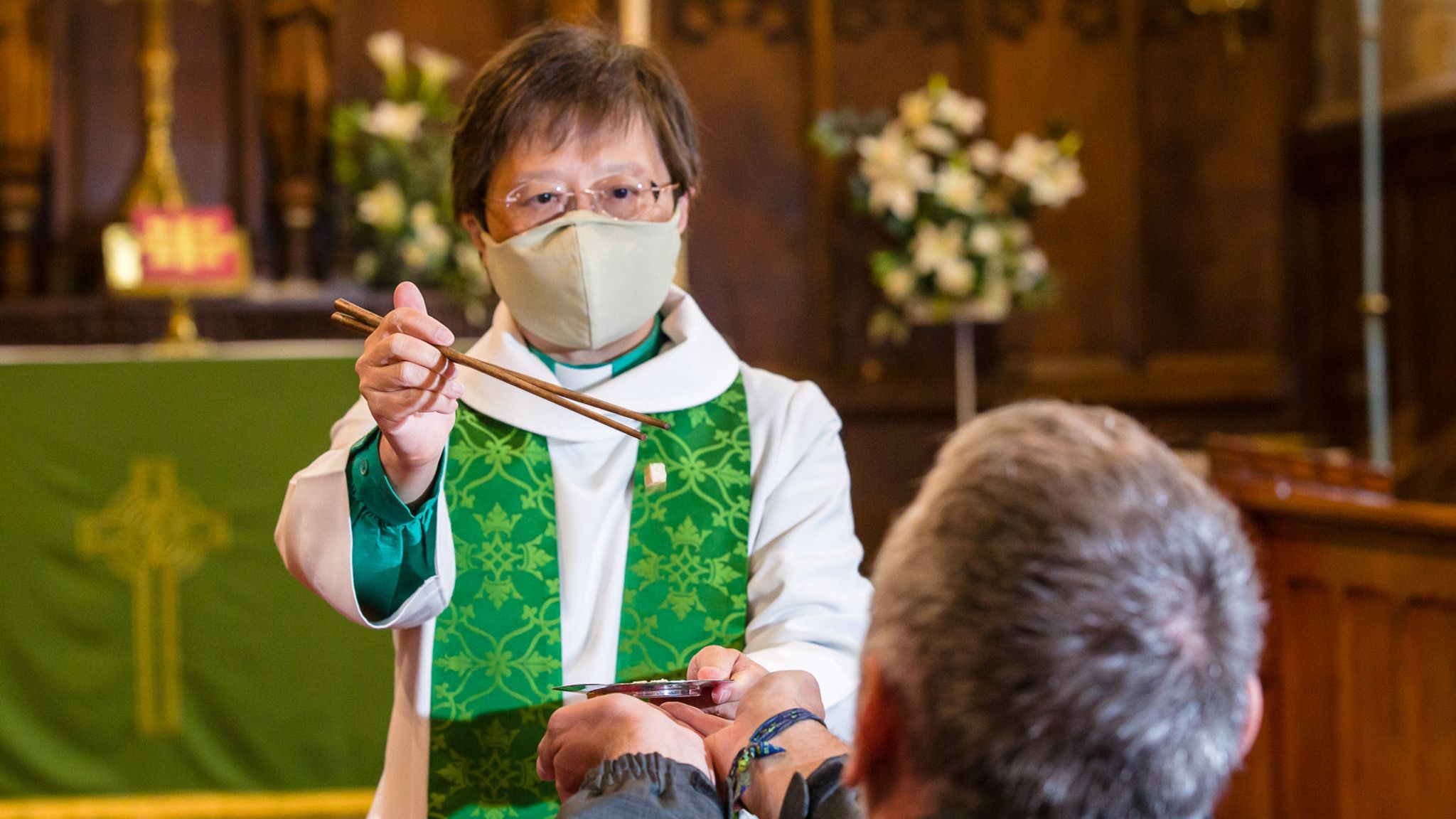 Coronavirus: Vicar uses chopsticks to serve bread in Holy Communion ...