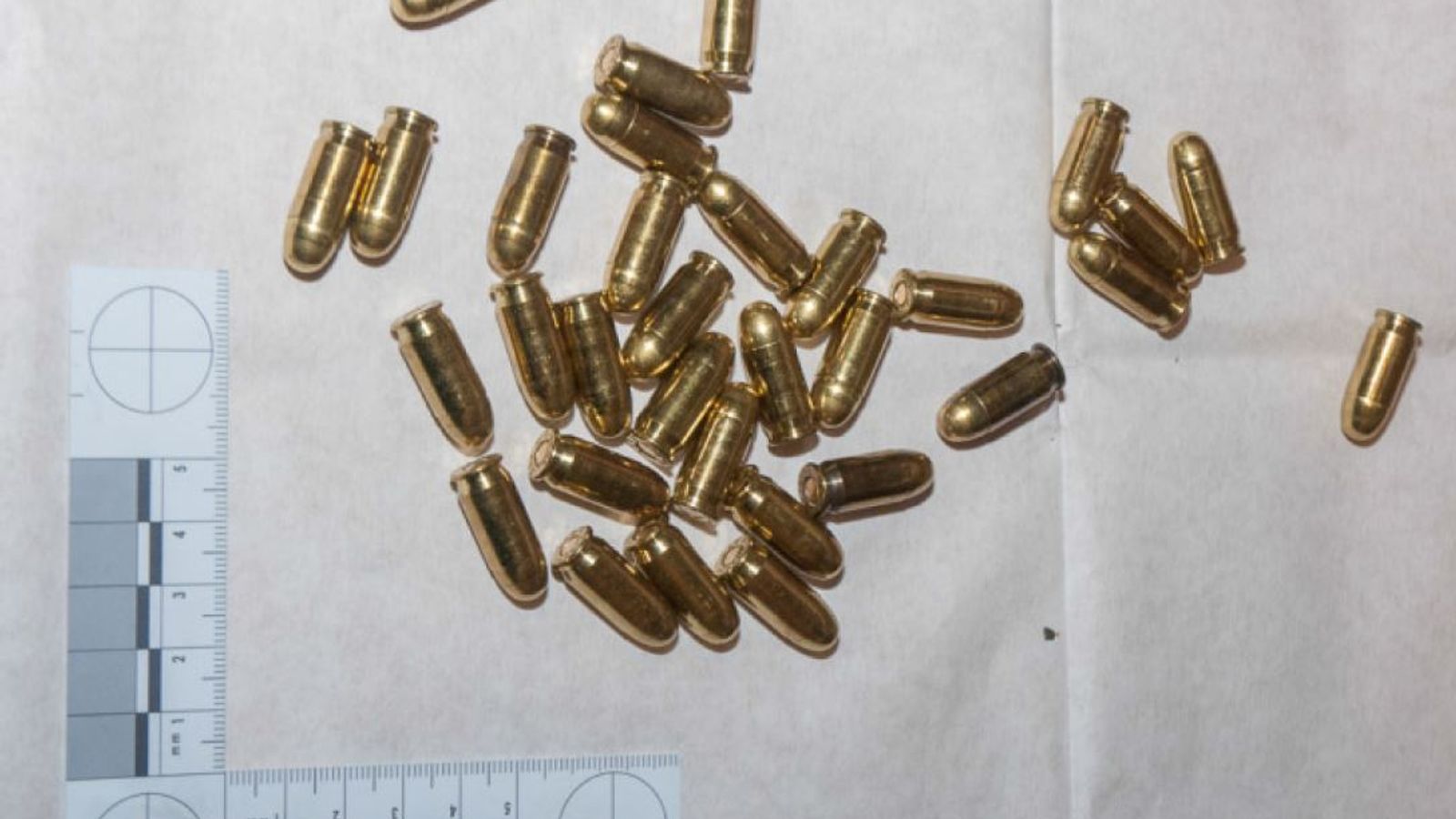 Two men jailed over gun deal witnessed by watching surveillance ...