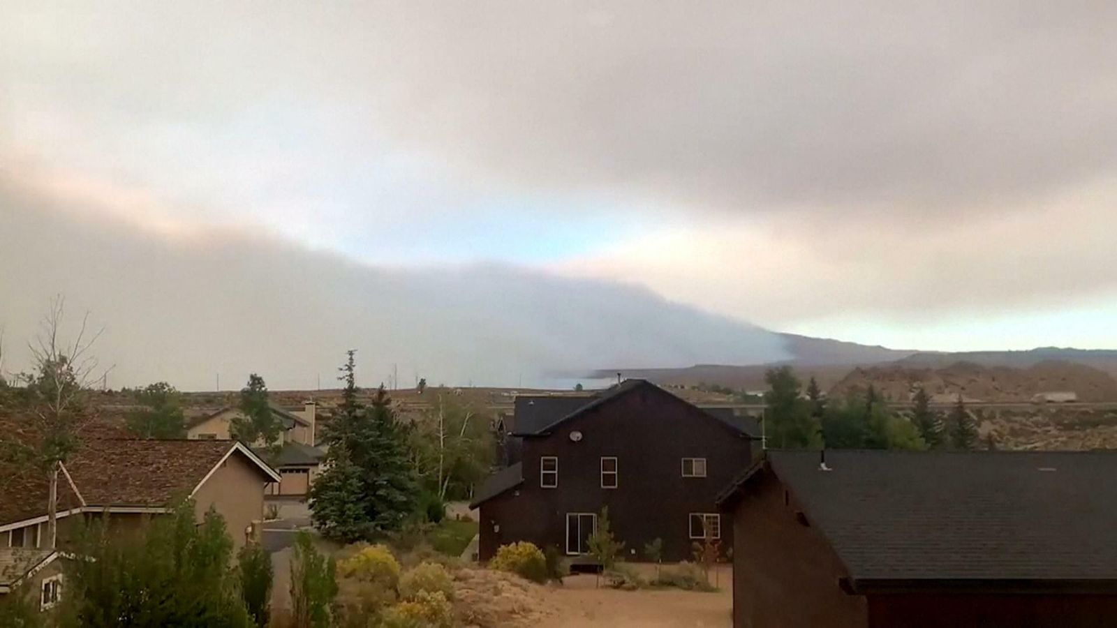 Timelapse shows wall of smoke engulf houses | US News | Sky News