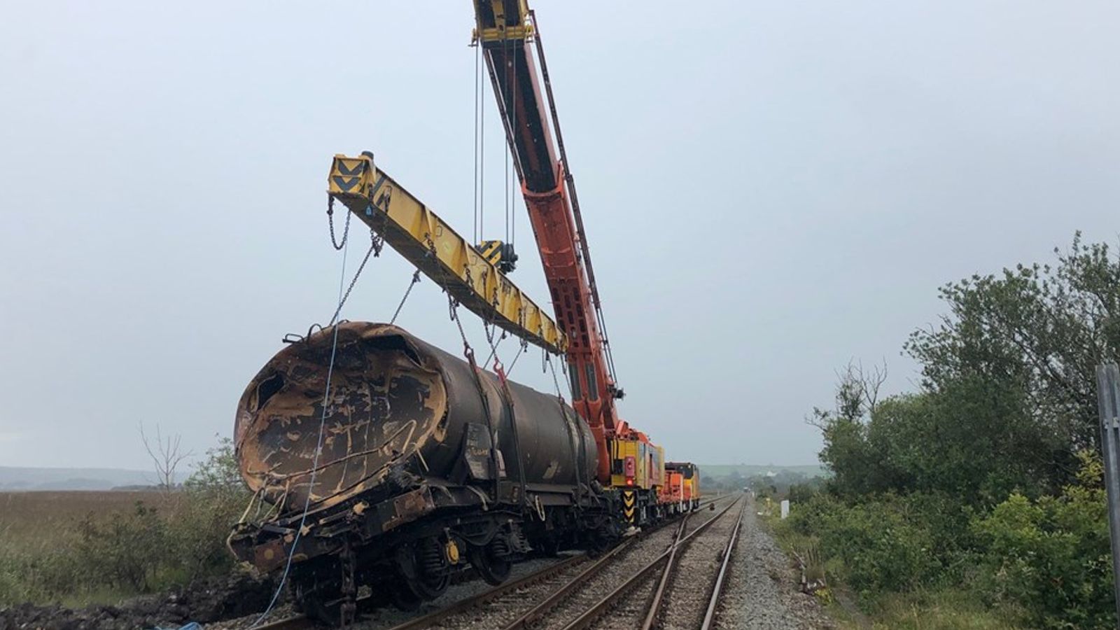 Train derailment that led to major fire in South Wales caused by faulty ...