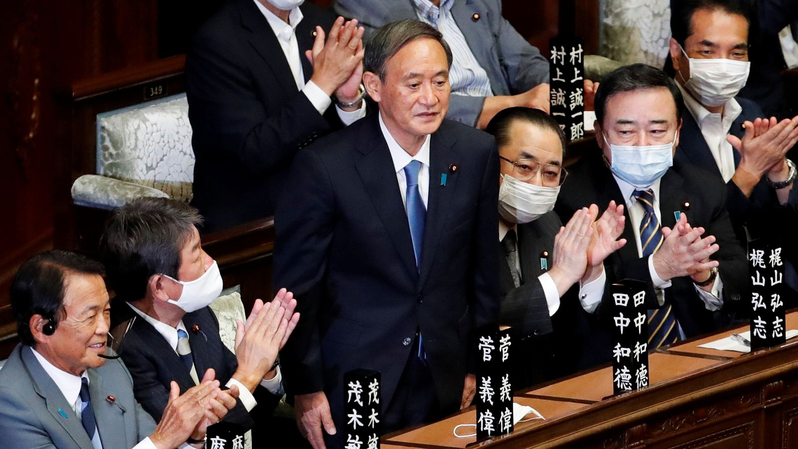 Japan's new prime minister Yoshihide Suga promises to turn round ...