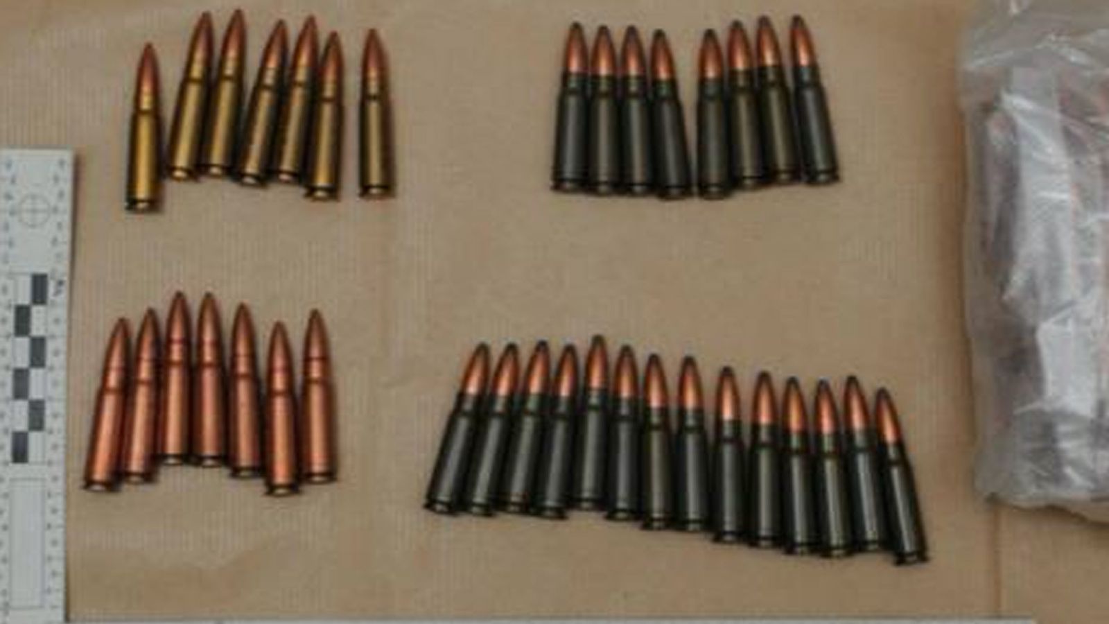 Uzi and AK-47 machine guns seized after police crack Encrochat phone ...