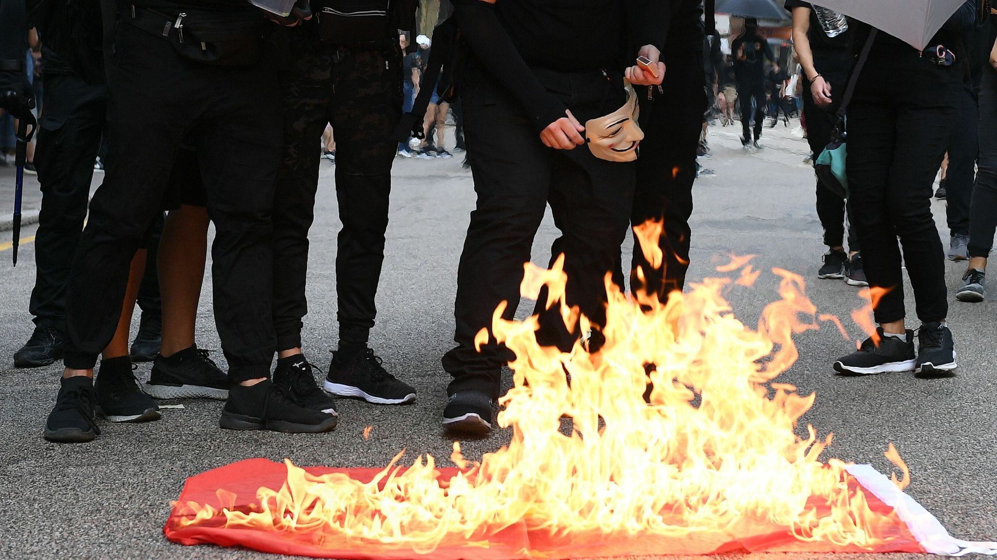 China criminalises insulting its national flag - including turning it ...