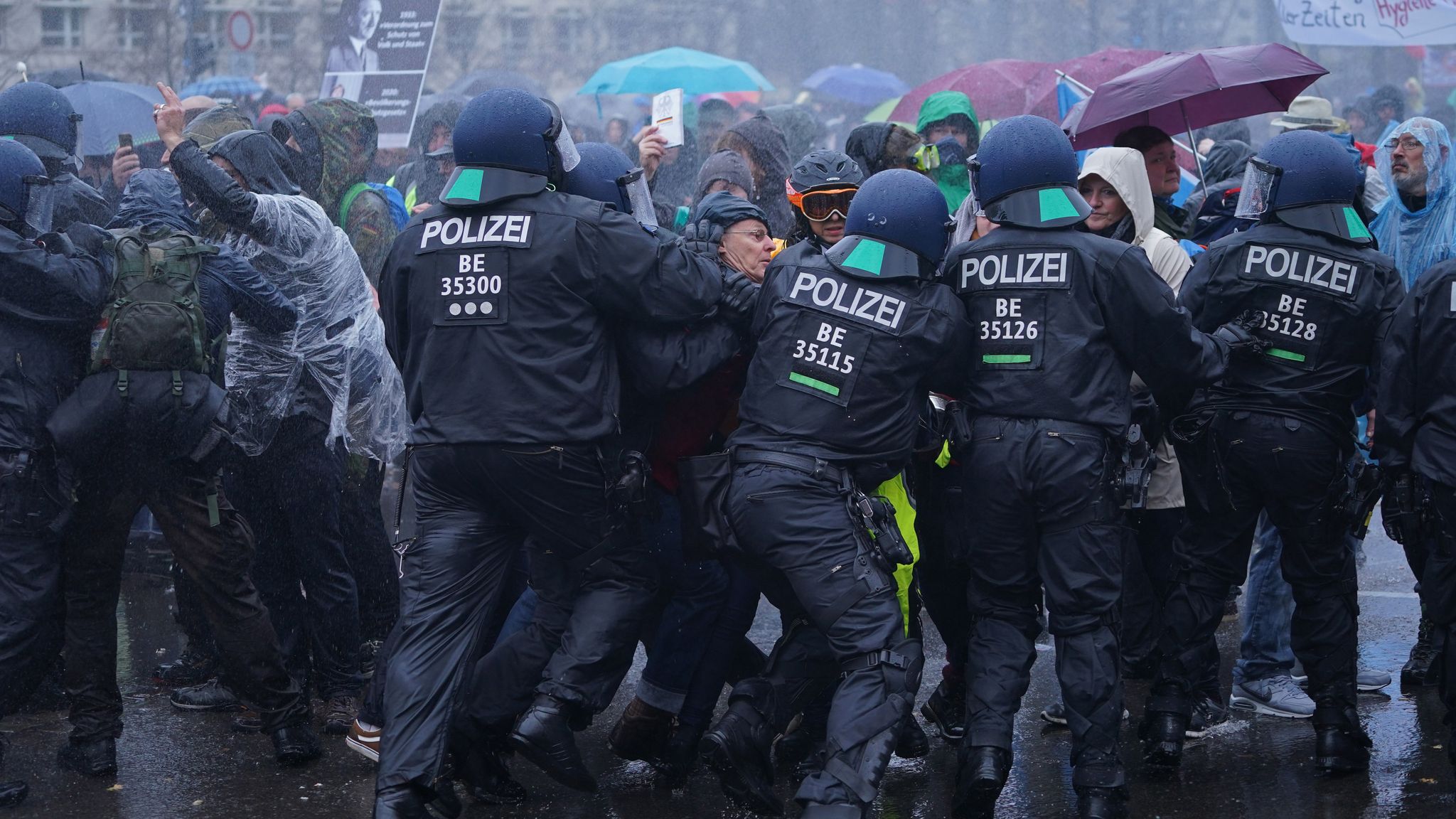 COVID-19: German police fire water cannon at restriction protesters ...