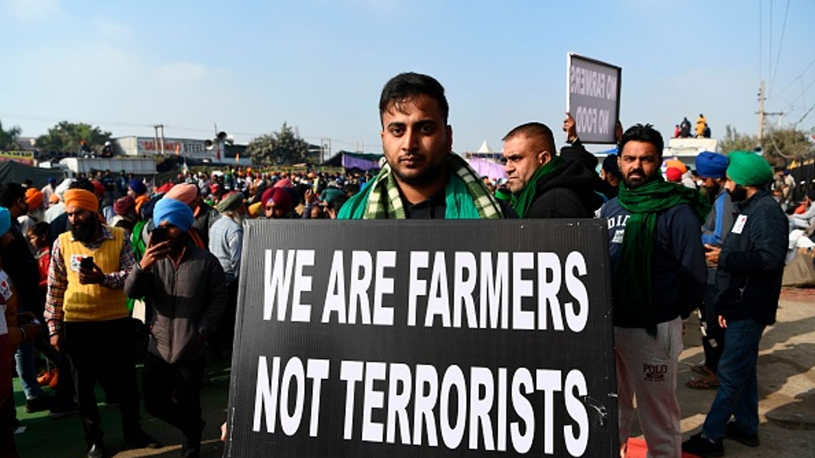 India farmers' protests: Anger grows over controversial laws as ...