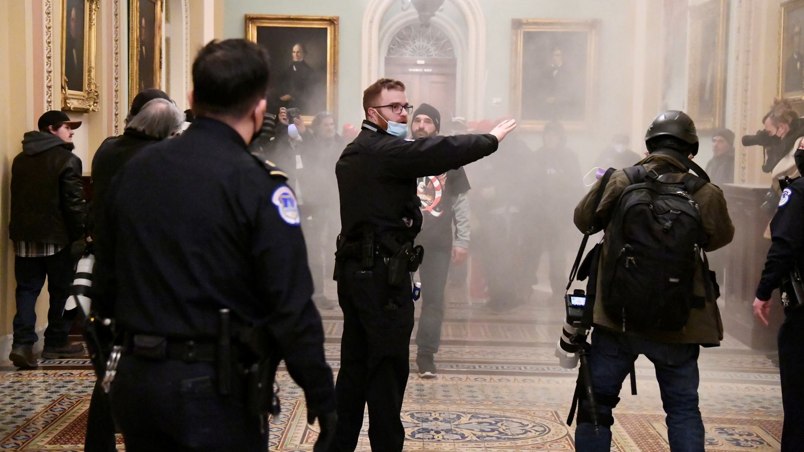 In pictures: Chaos as pro-Trump protesters break barricade and storm ...