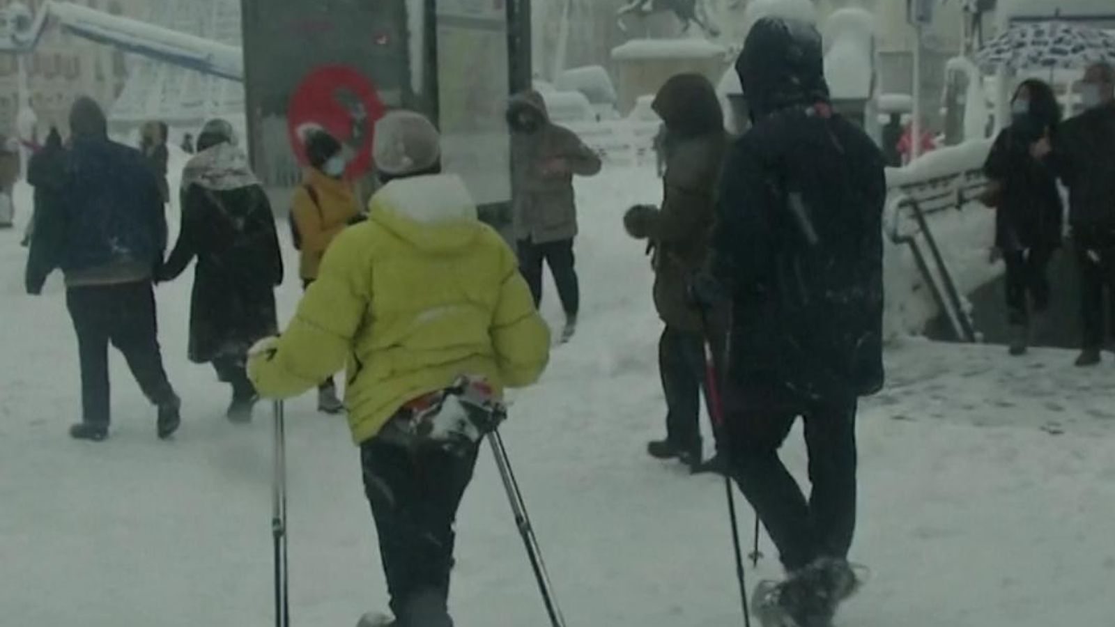 Spain snowstorm: People grab their skis amid rare weather in Madrid ...
