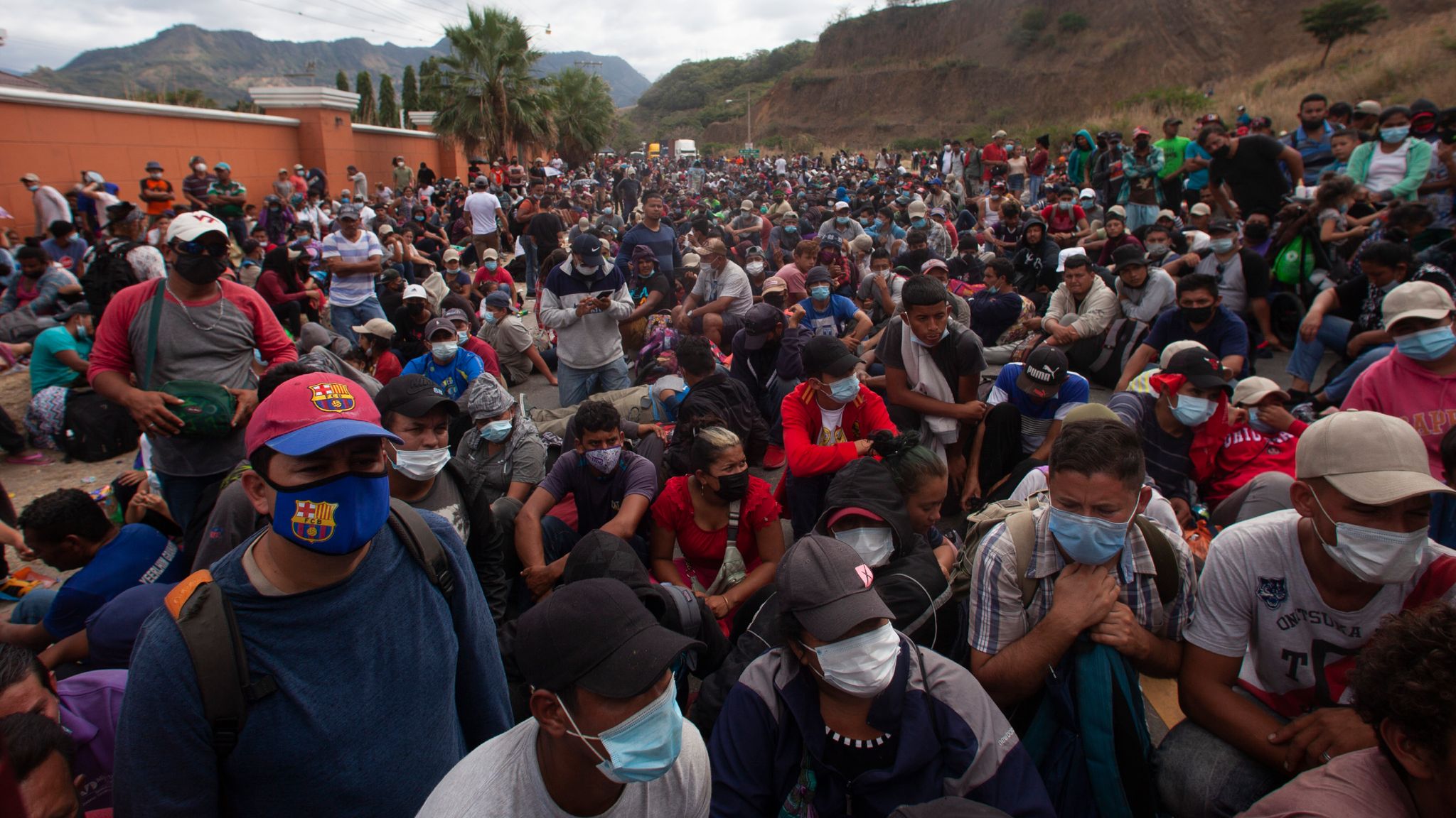 Guatemala: Honduran migrants heading for US camp out after violent ...