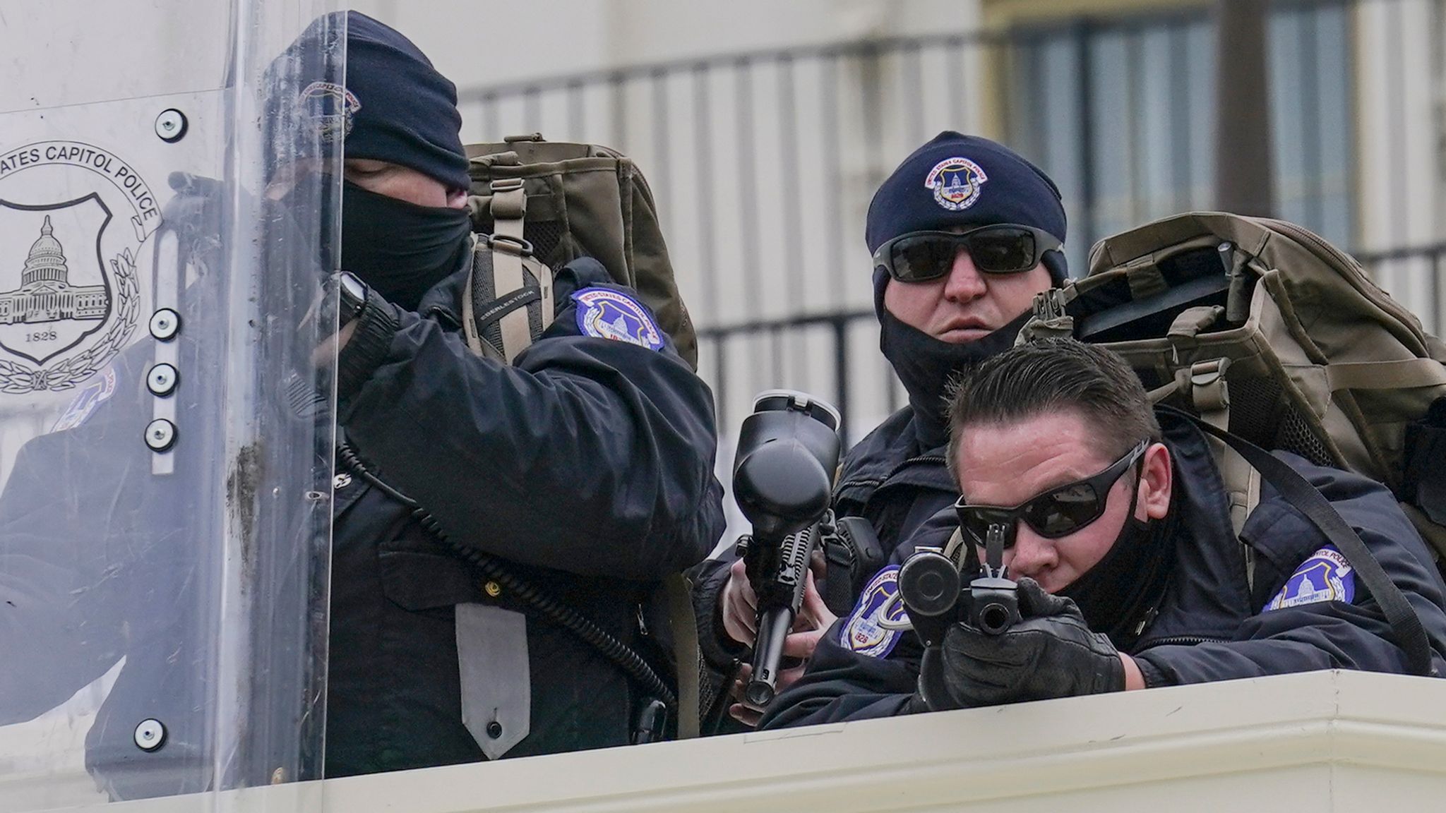 In pictures: Chaos as pro-Trump protesters break barricade and storm ...