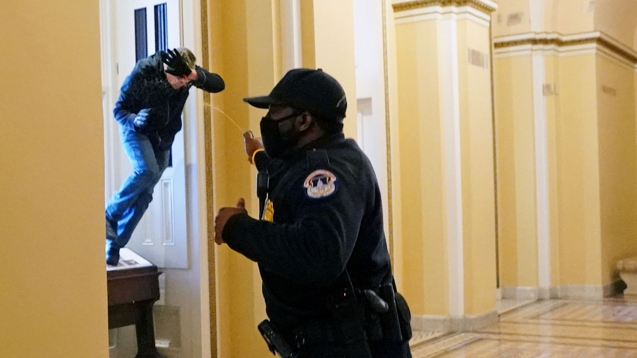 In pictures: Chaos as pro-Trump protesters break barricade and storm ...