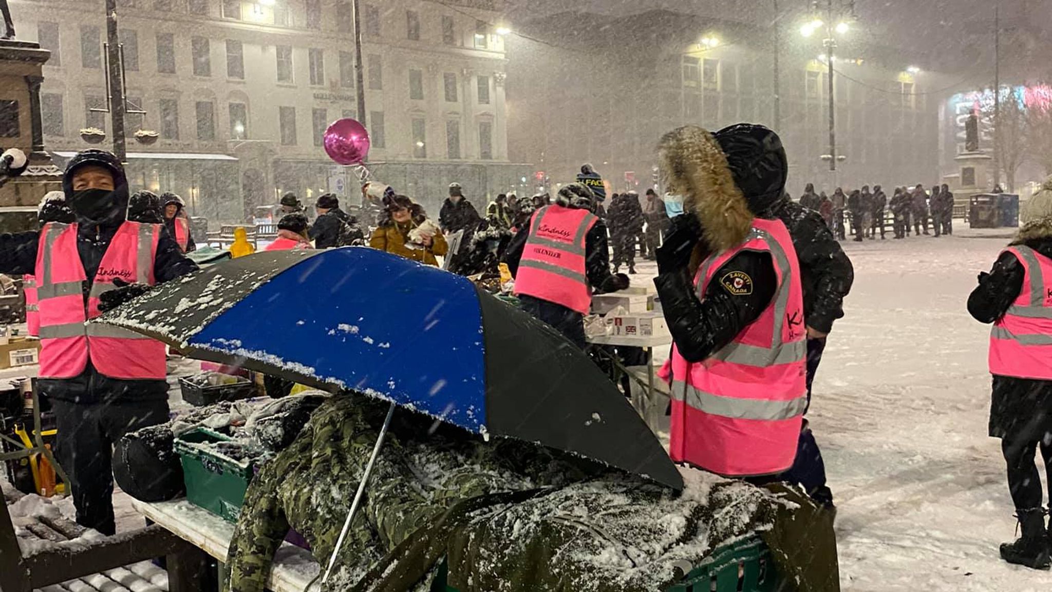 Fury over photo of 200 homeless people queuing for food amid freezing ...