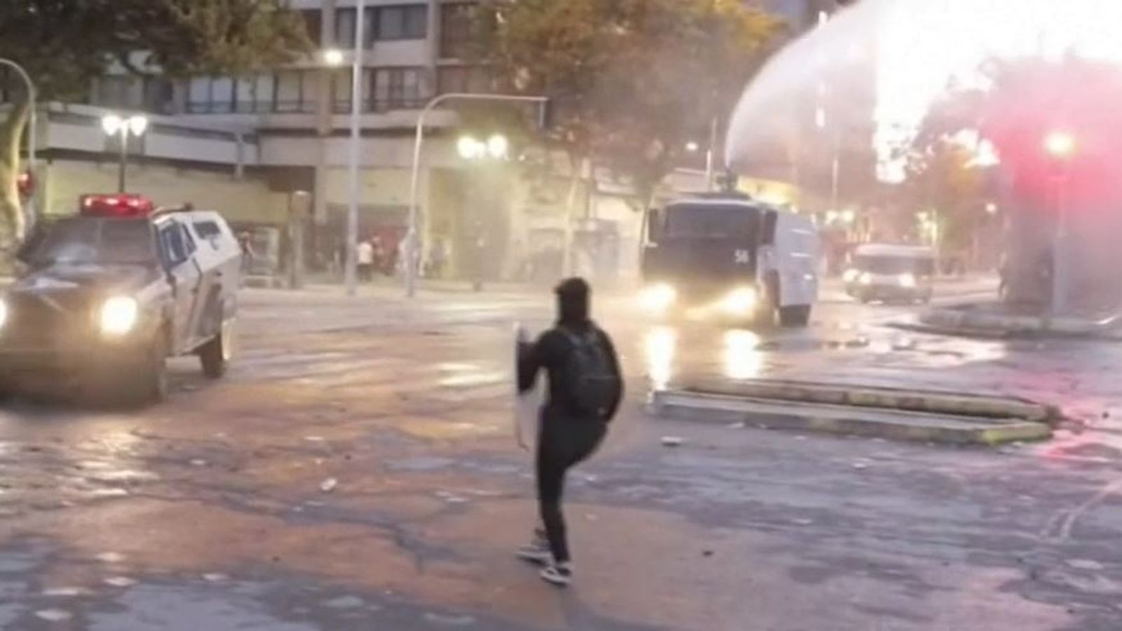 COVID-19: Water canon and tear gas in Chile student protest over ...