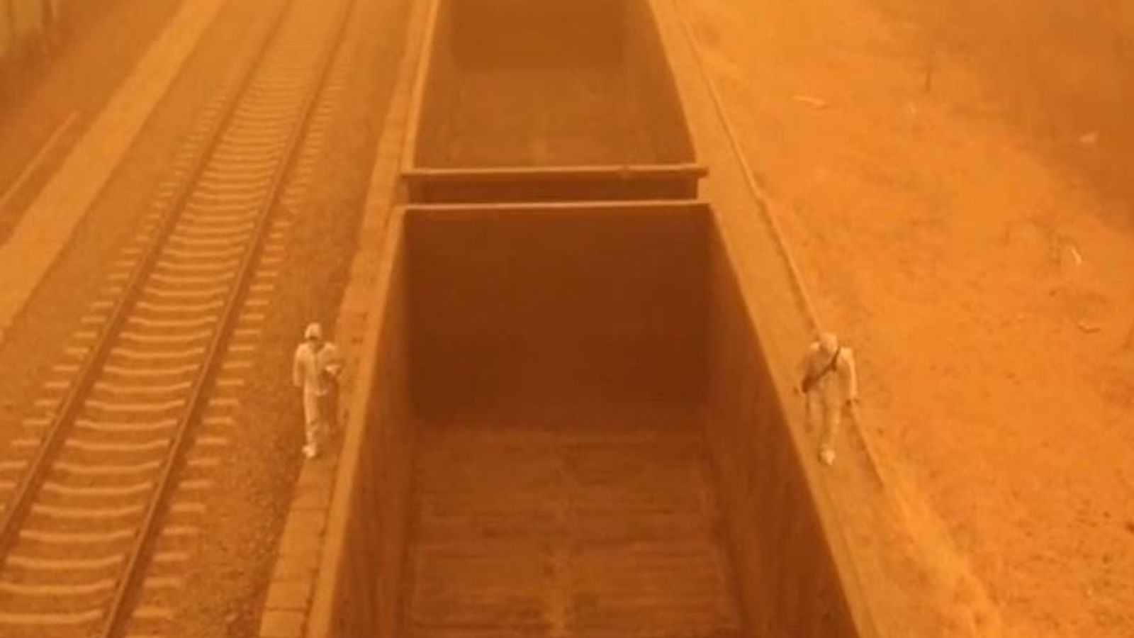 China: Beijing sandstorm turns air an eerie orange | Sky News