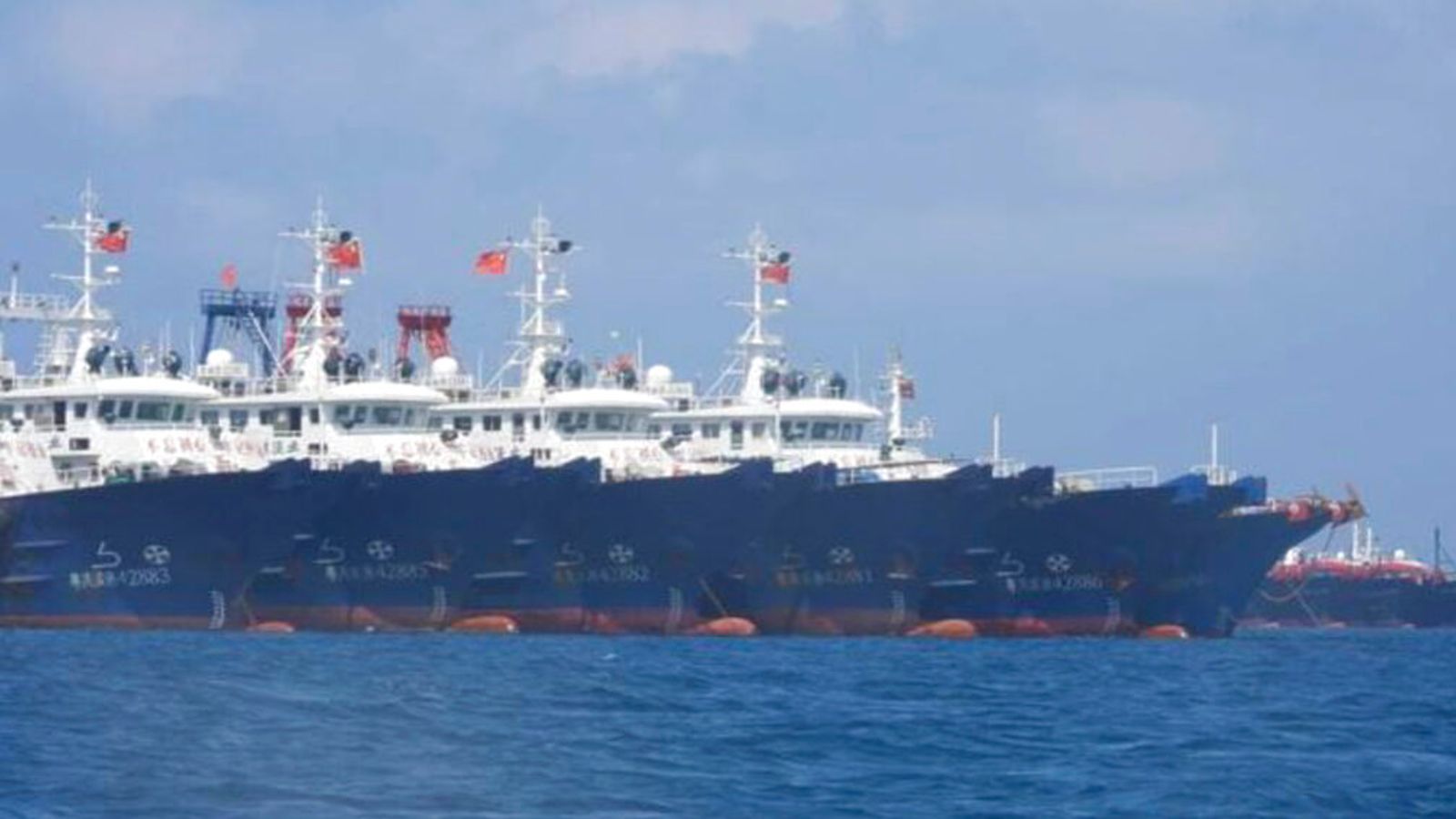 South China Sea Philippines Complains After 200 Swarming And
