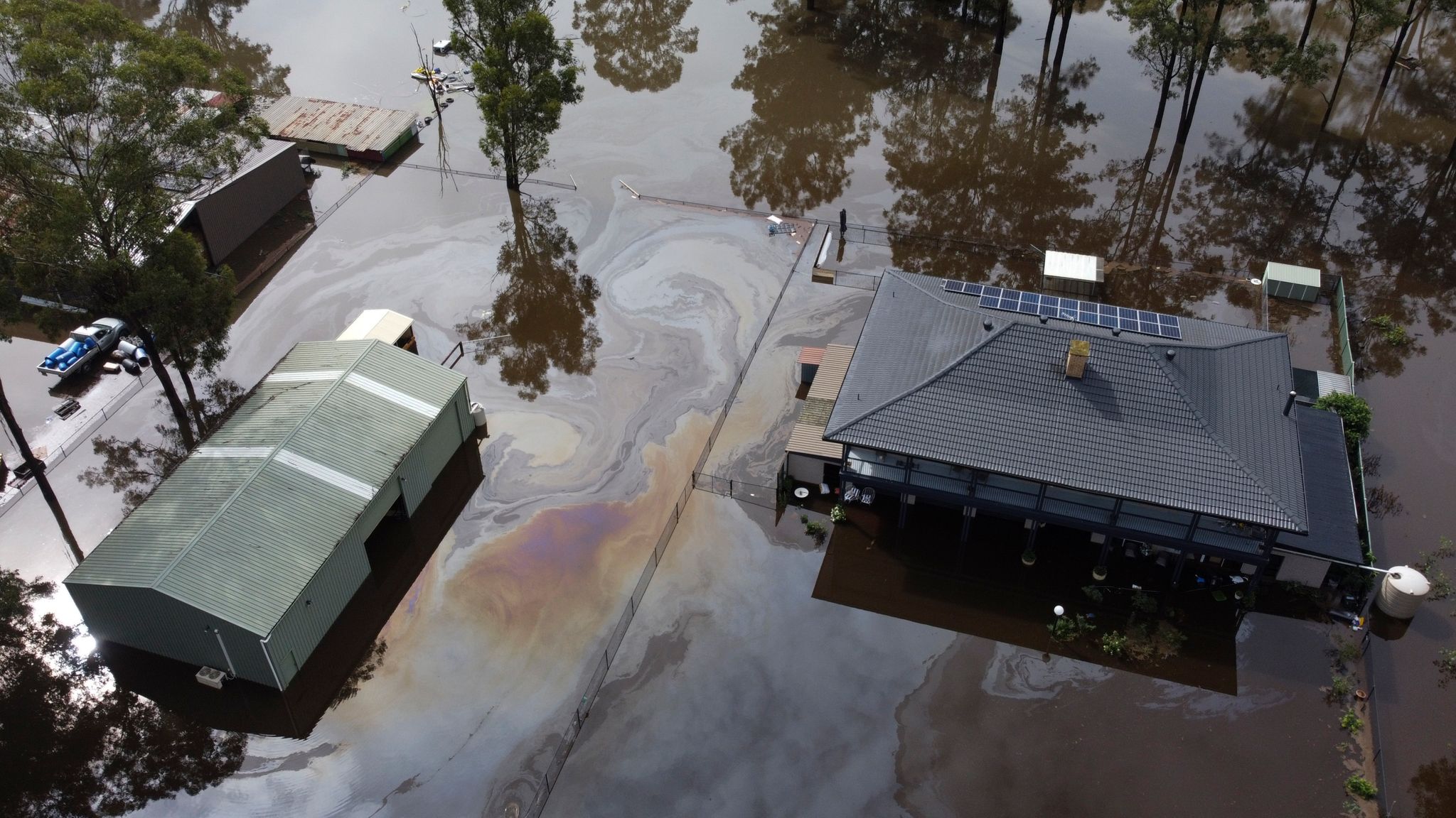 Australia floods: The town 'smashed' as water levels rose 40ft in hours ...