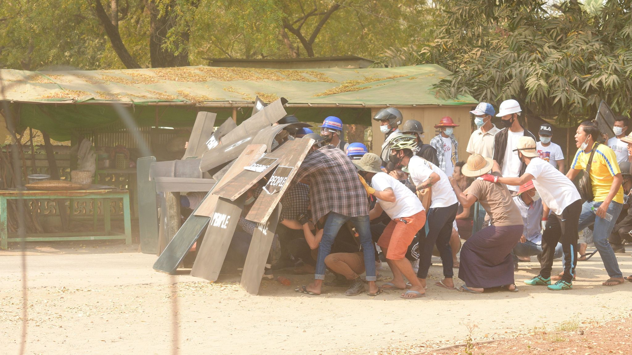 Myanmar protests: Demonstrators 'fired on' amid funeral of political ...