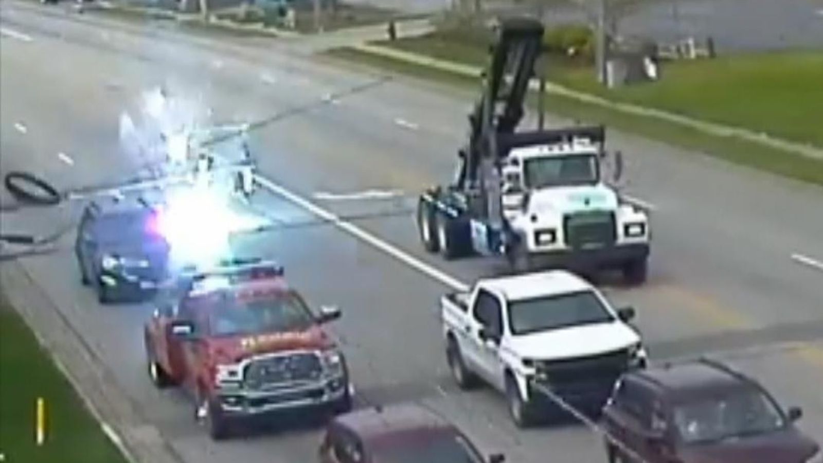 Electricity pylon narrowly misses car | World News | Sky News