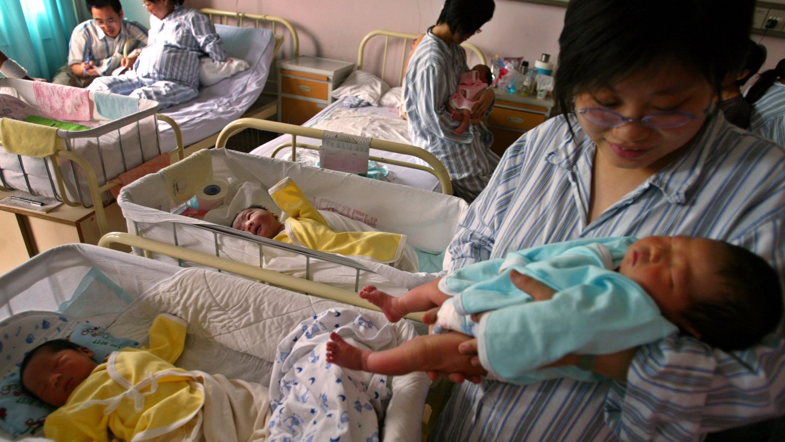 China to allow couples to have three children as it scraps two-child ...