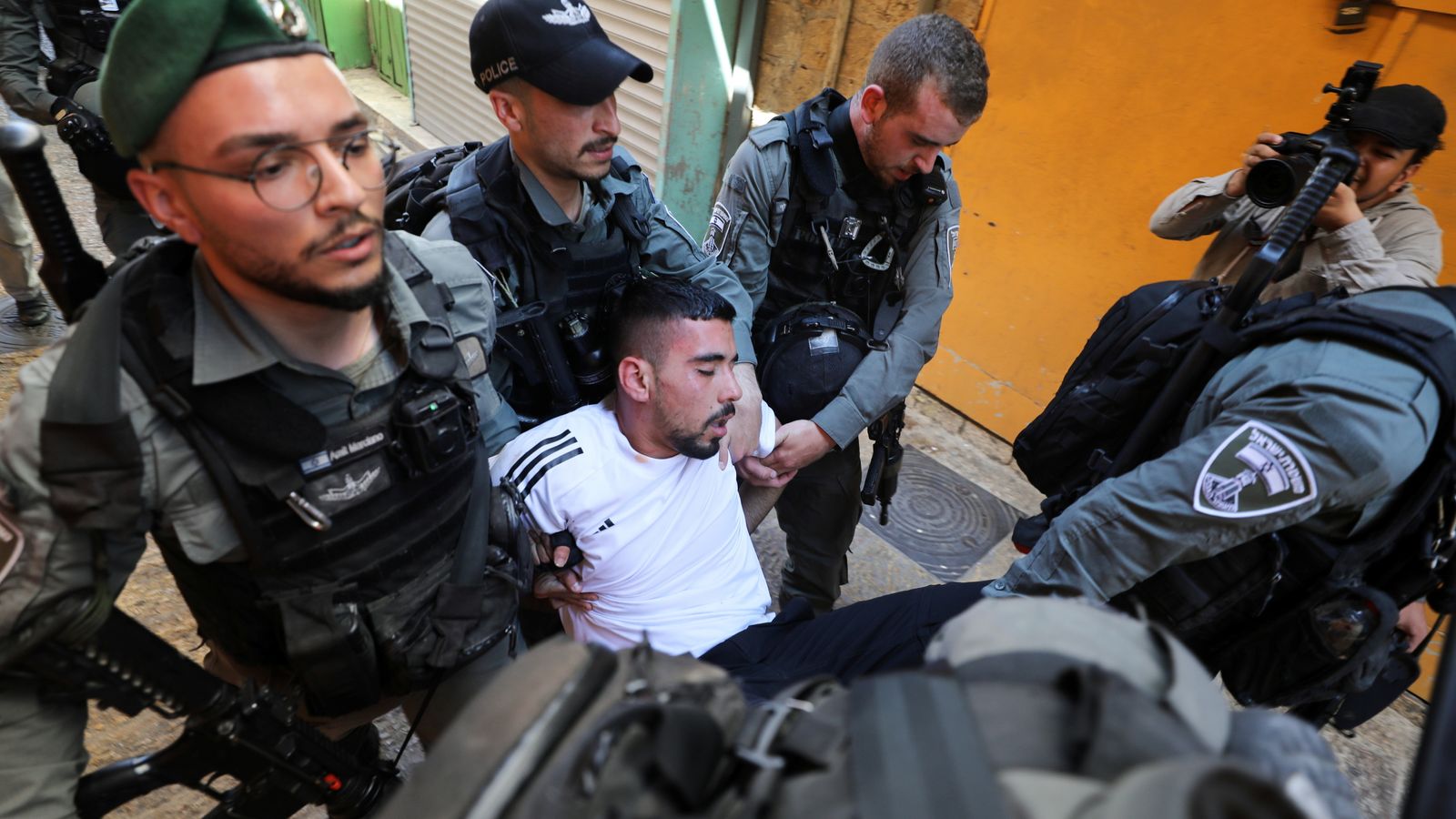 Palestinian protesters dodge stun grenades and 'skunk' spray as ...