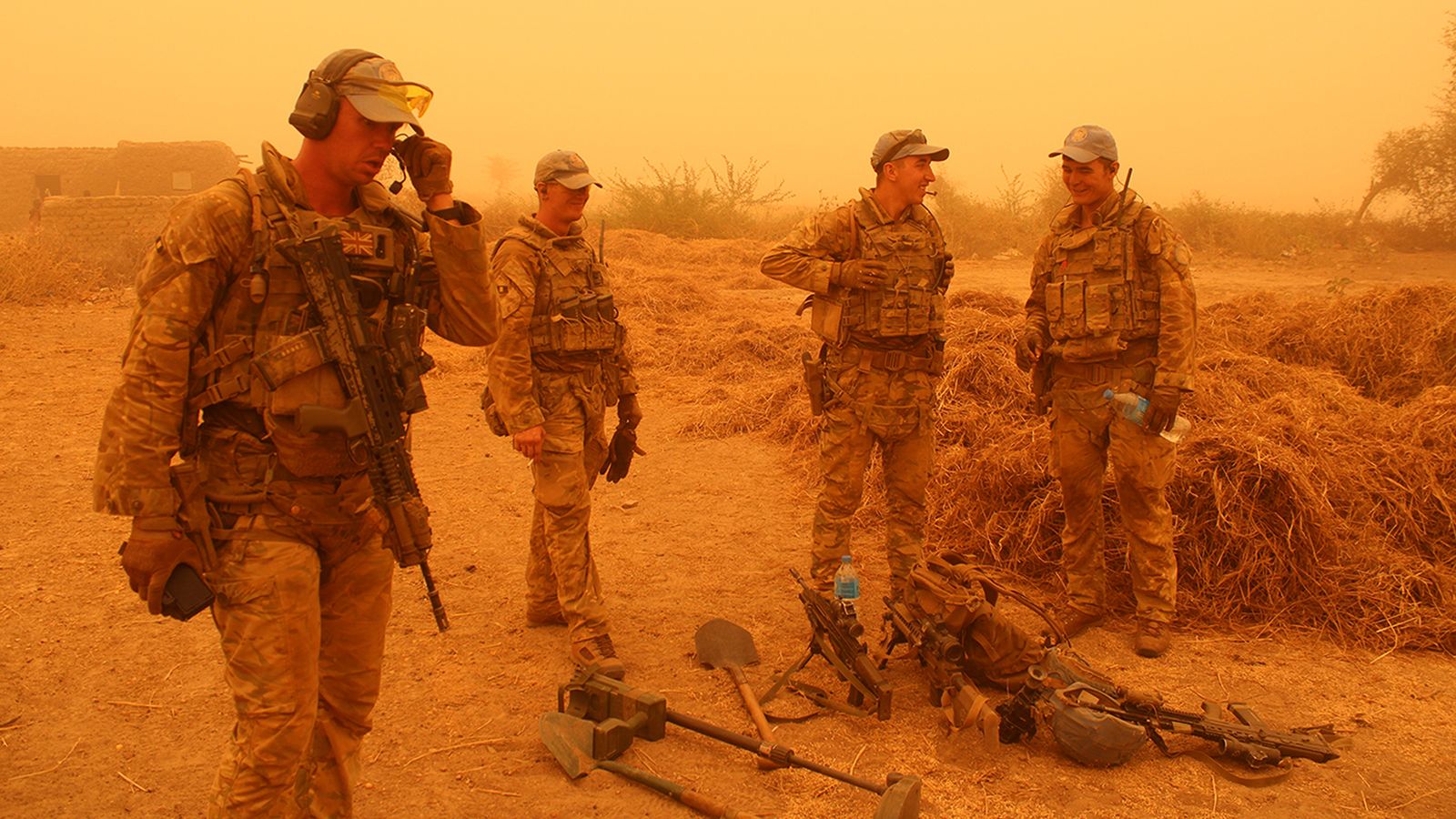 British troops battle sandstorm to seize Islamic State weapons cache ...