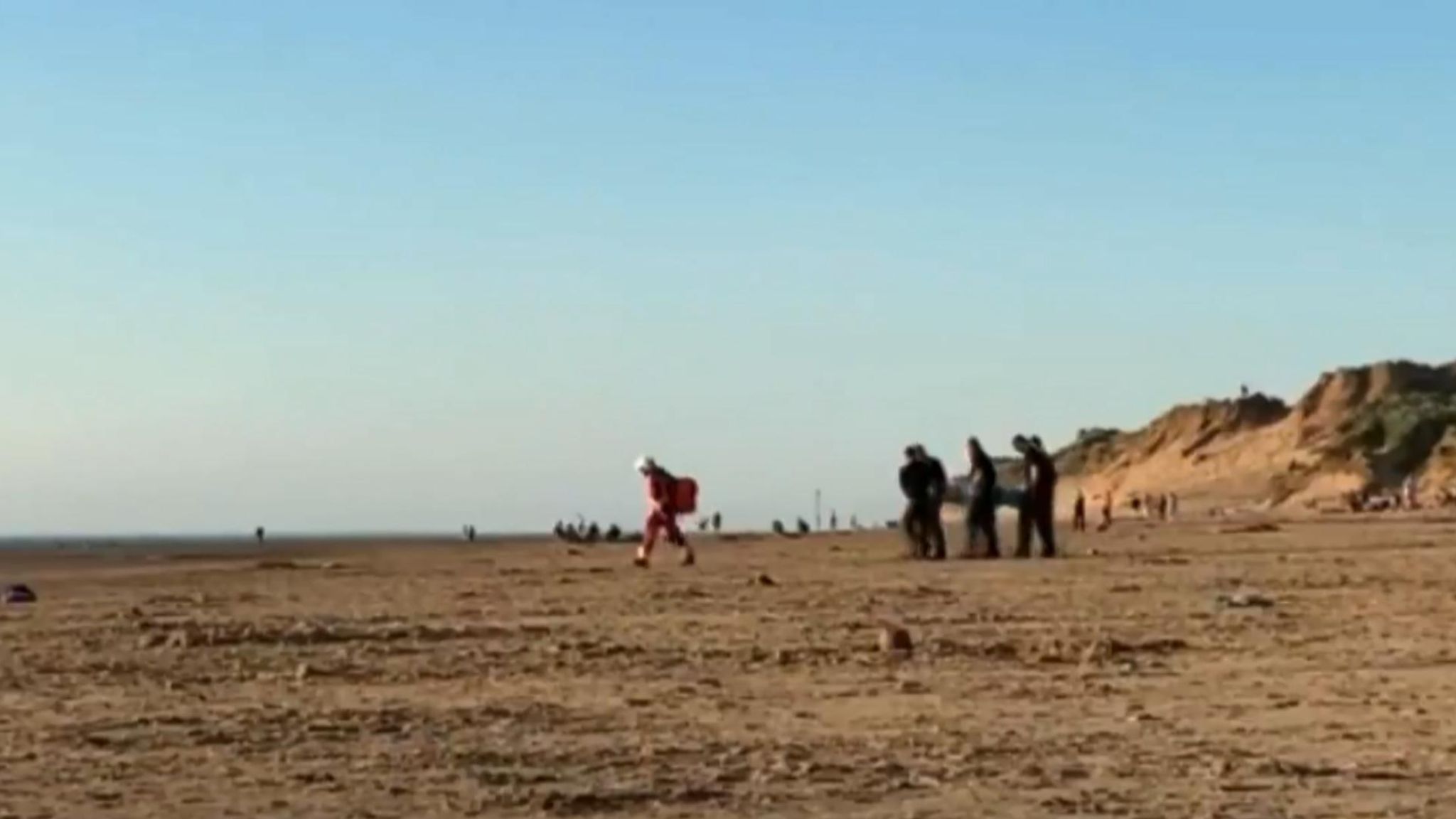 Formby beach stabbing: 'Axe and samurai sword' used as three men ...