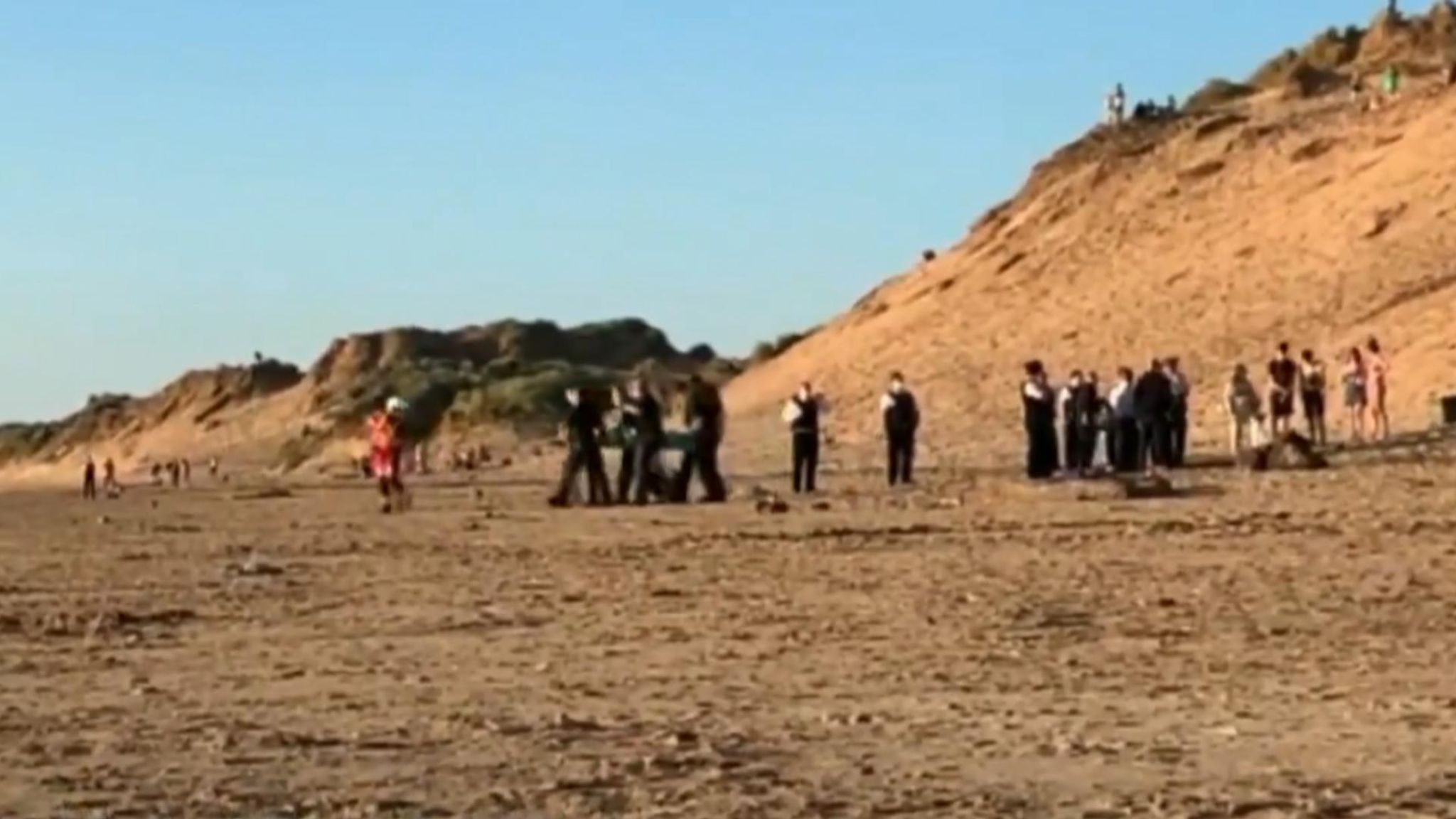 Formby beach stabbing: 'Axe and samurai sword' used as three men ...