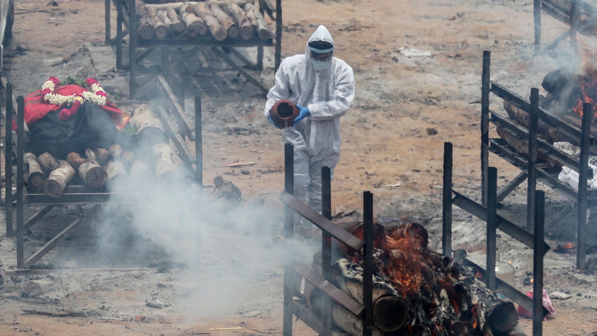 COVID-19: Bodies wash up on banks of river Ganges as deaths pass ...