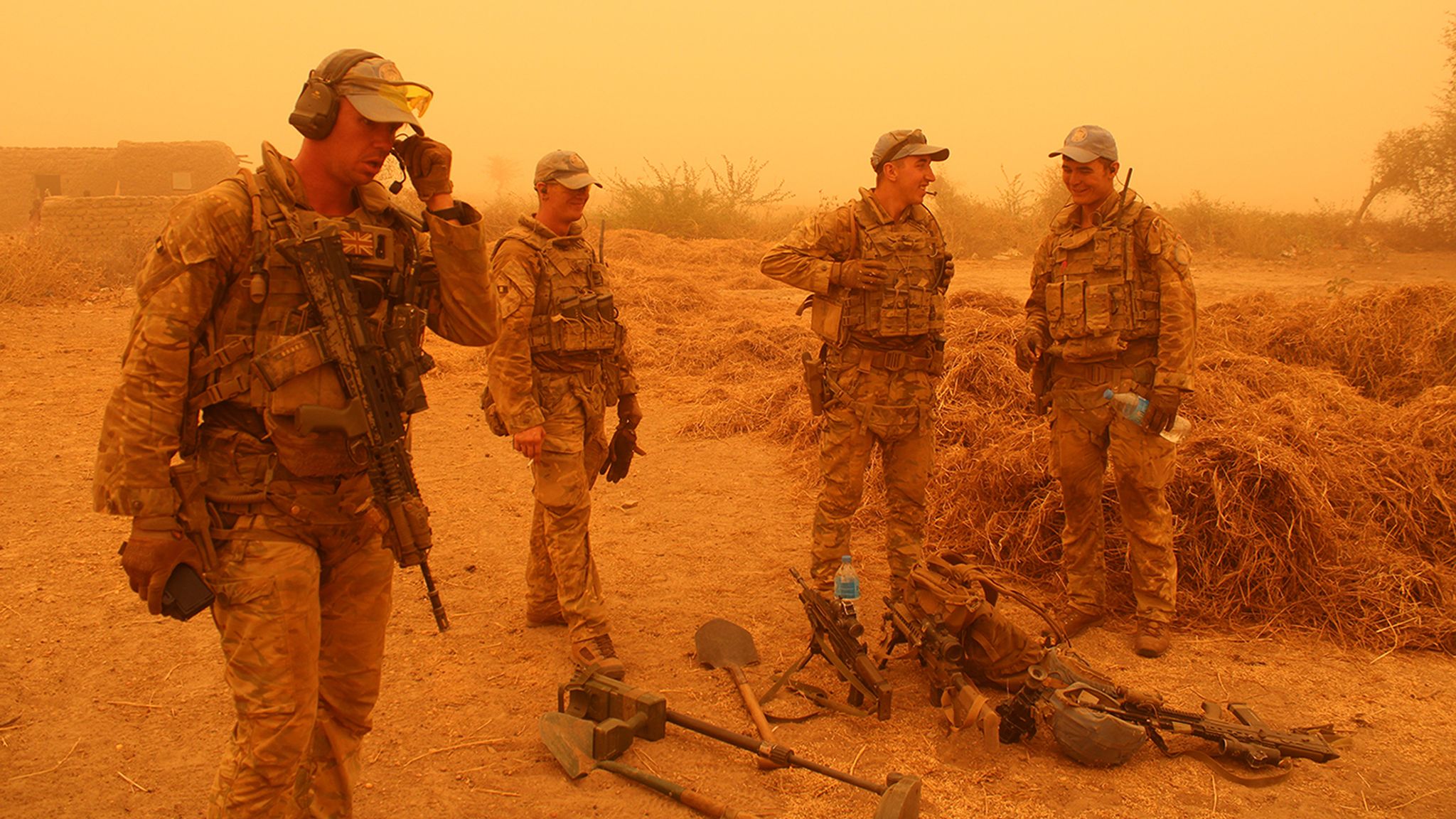 British troops battle sandstorm to seize Islamic State weapons cache ...