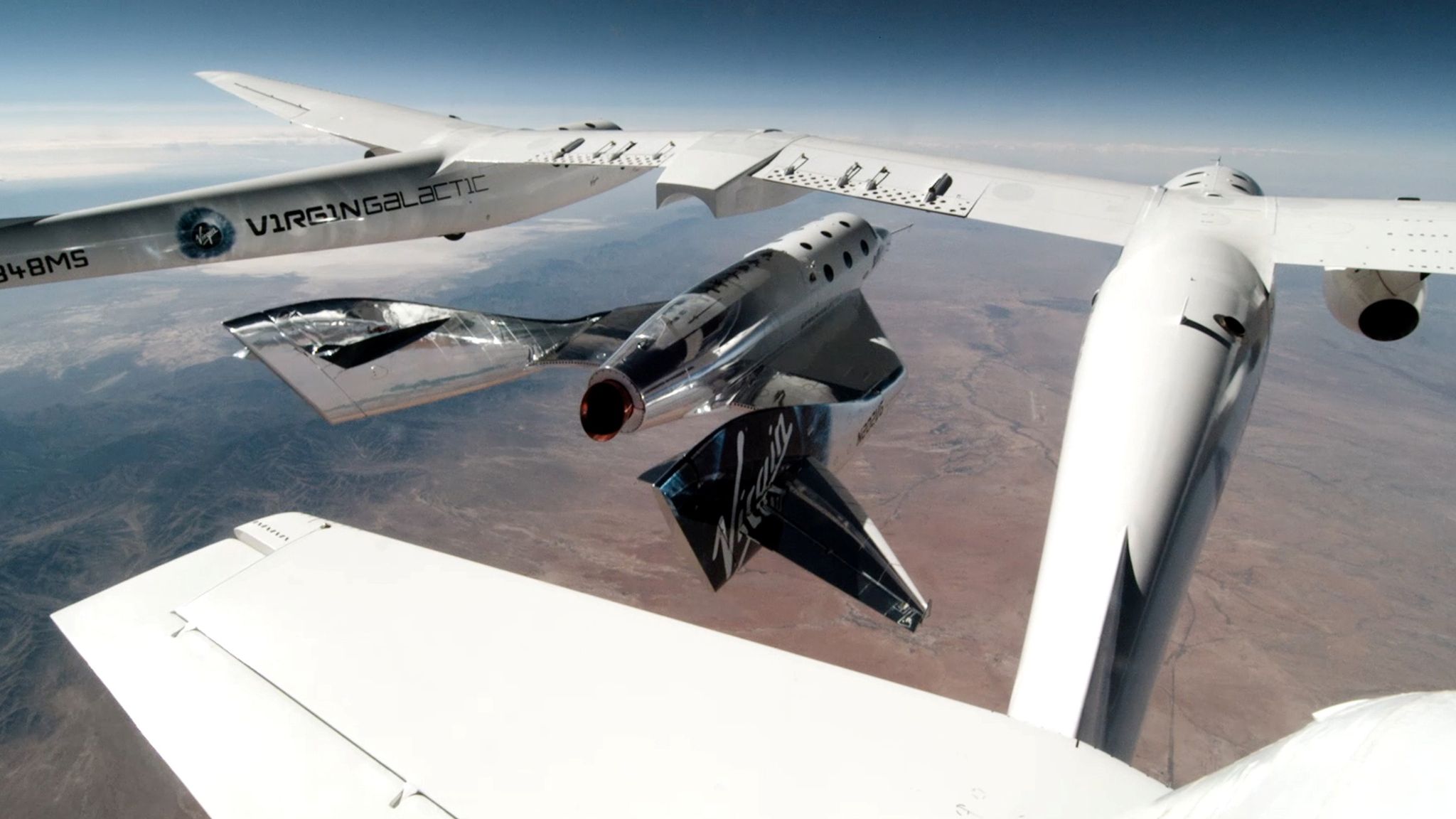 Virgin Galactic rocket ship soars to the fringe of space as company ...