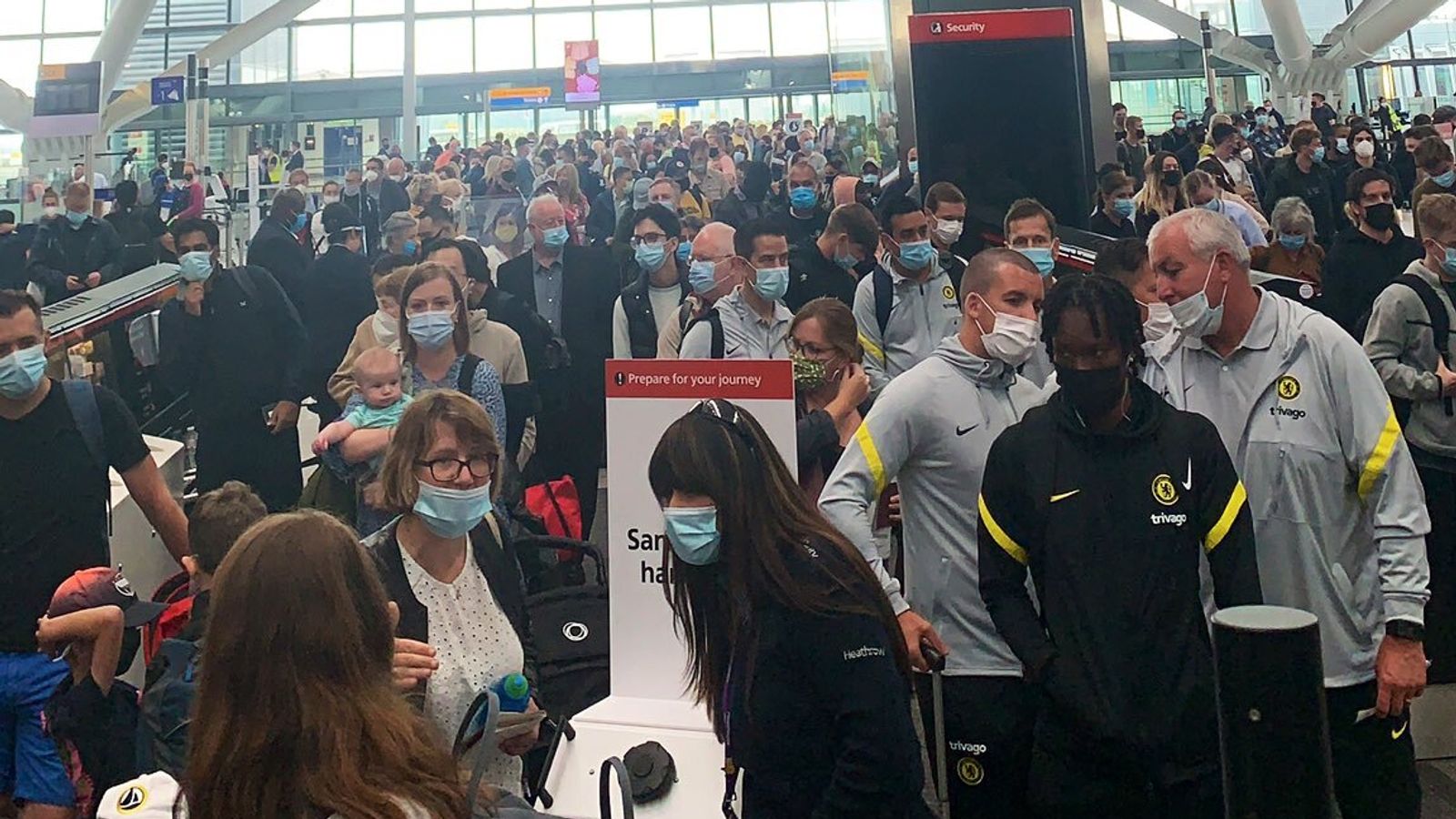 Heathrow Airport: Passengers stuck in long queues as security staff are ...
