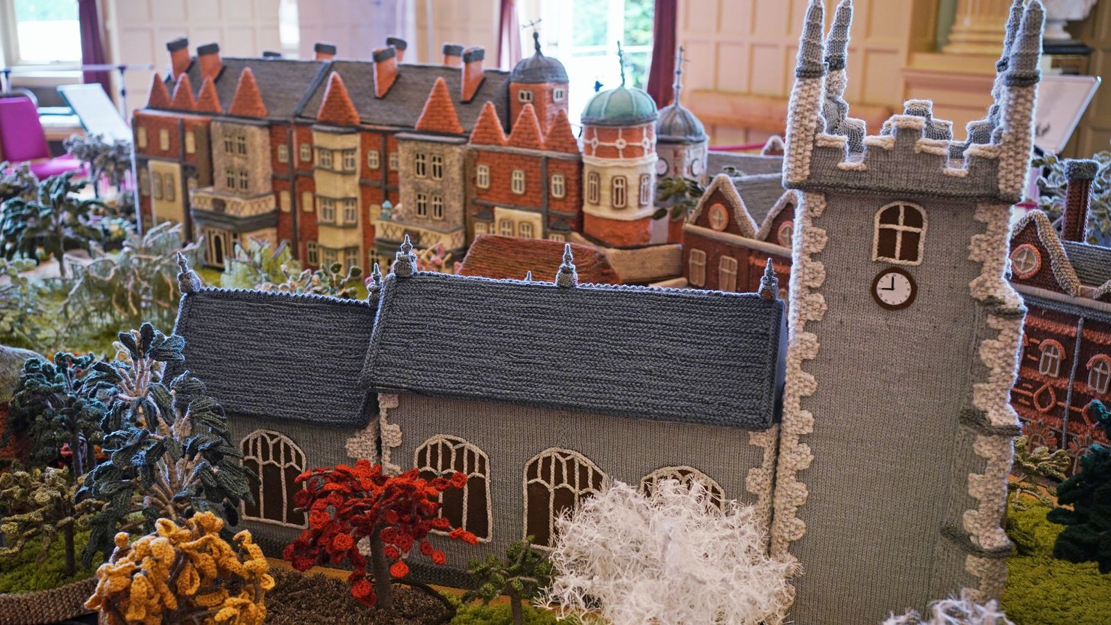 Queen enjoys display of 18ft-long 'knitted Sandringham', says 92-year ...