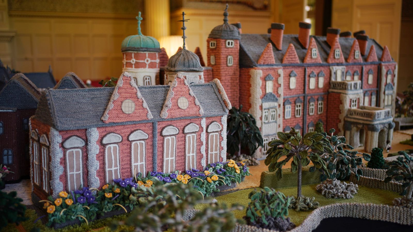 Queen enjoys display of 18ft-long 'knitted Sandringham', says 92-year ...