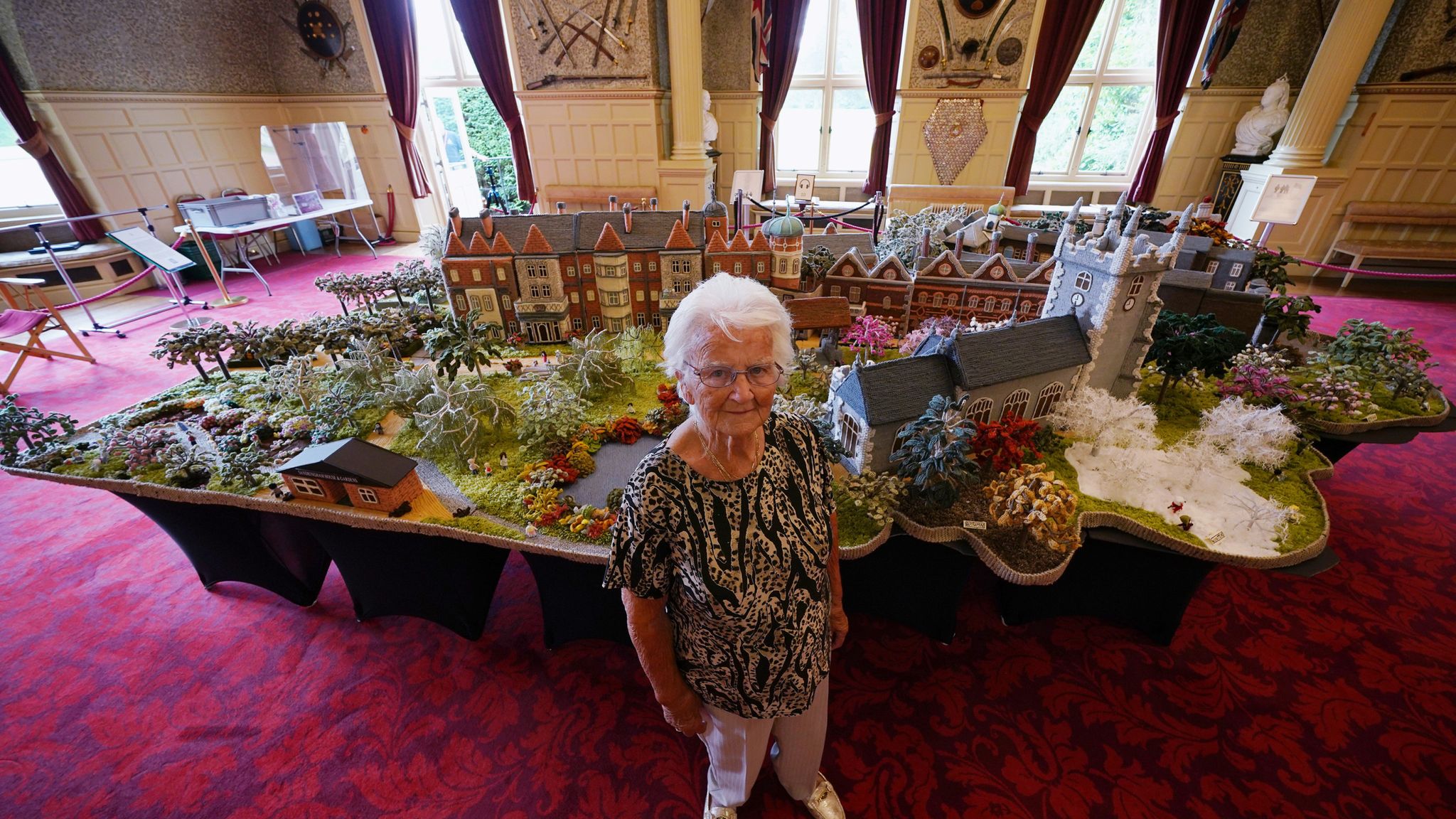 Queen enjoys display of 18ft-long 'knitted Sandringham', says 92-year ...