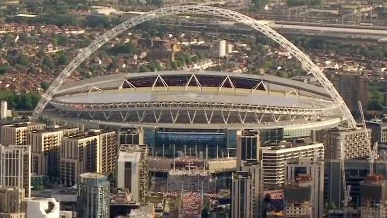 On the way to Wembley! Fans assemble at stadium for England and Denmark ...
