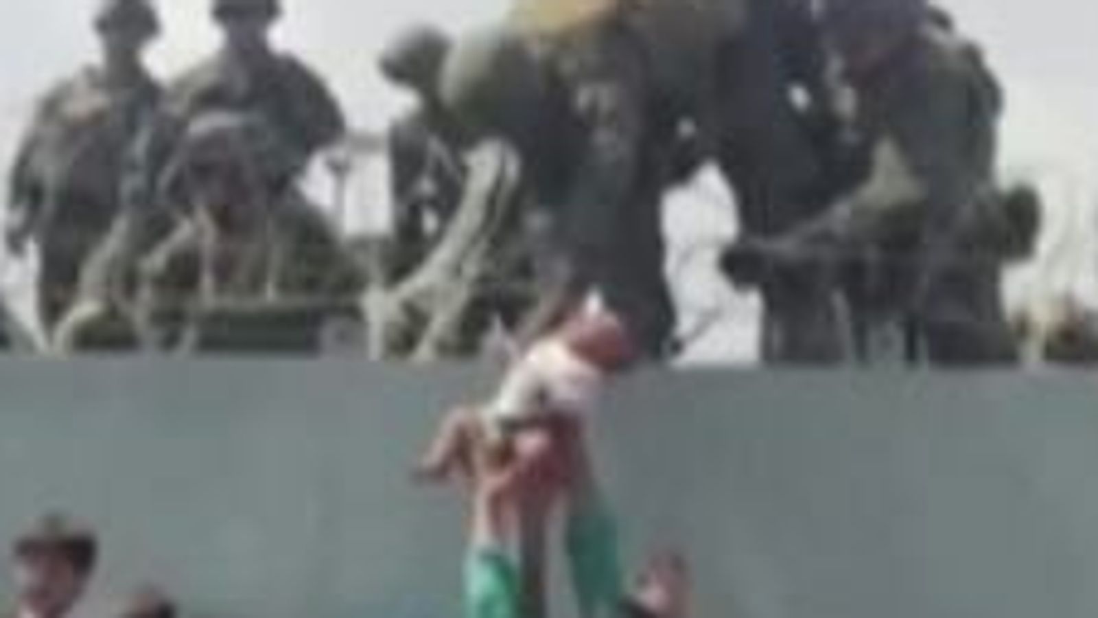 Afghanistan: Baby passed over razor wire to troops in Kabul | World ...