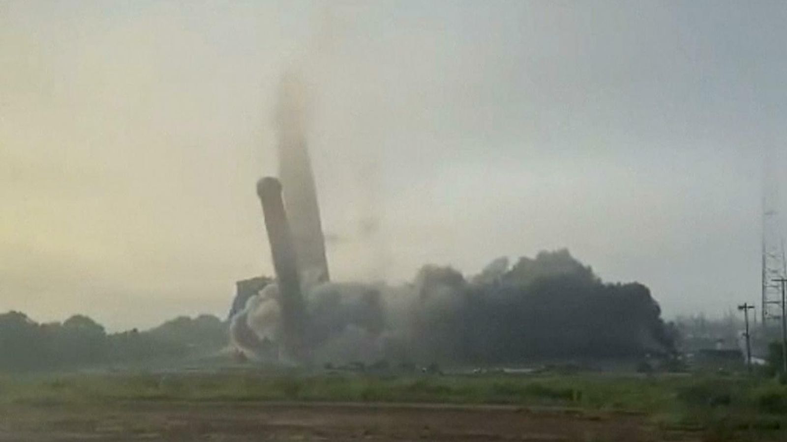 Alabama: Moment six smokestacks were toppled at old power plant | US ...