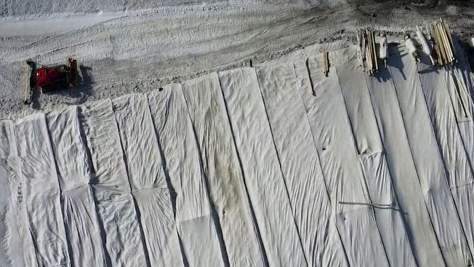 Alps covered in giant white sheets to stop the ice and snow from ...