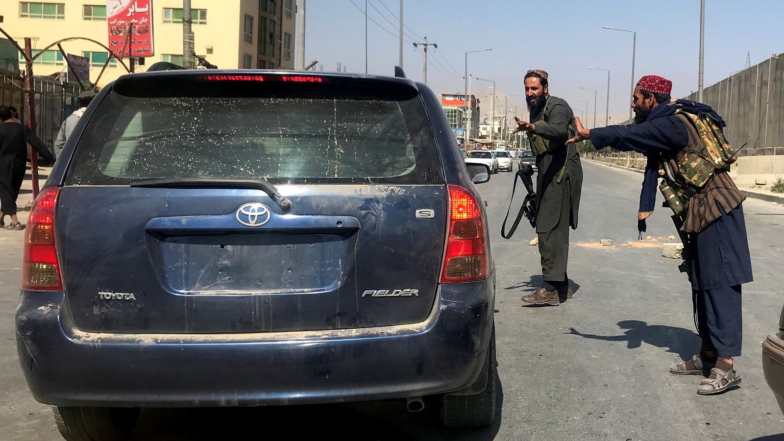 In pictures: Chaos across Kabul as Taliban takes control of Afghan ...