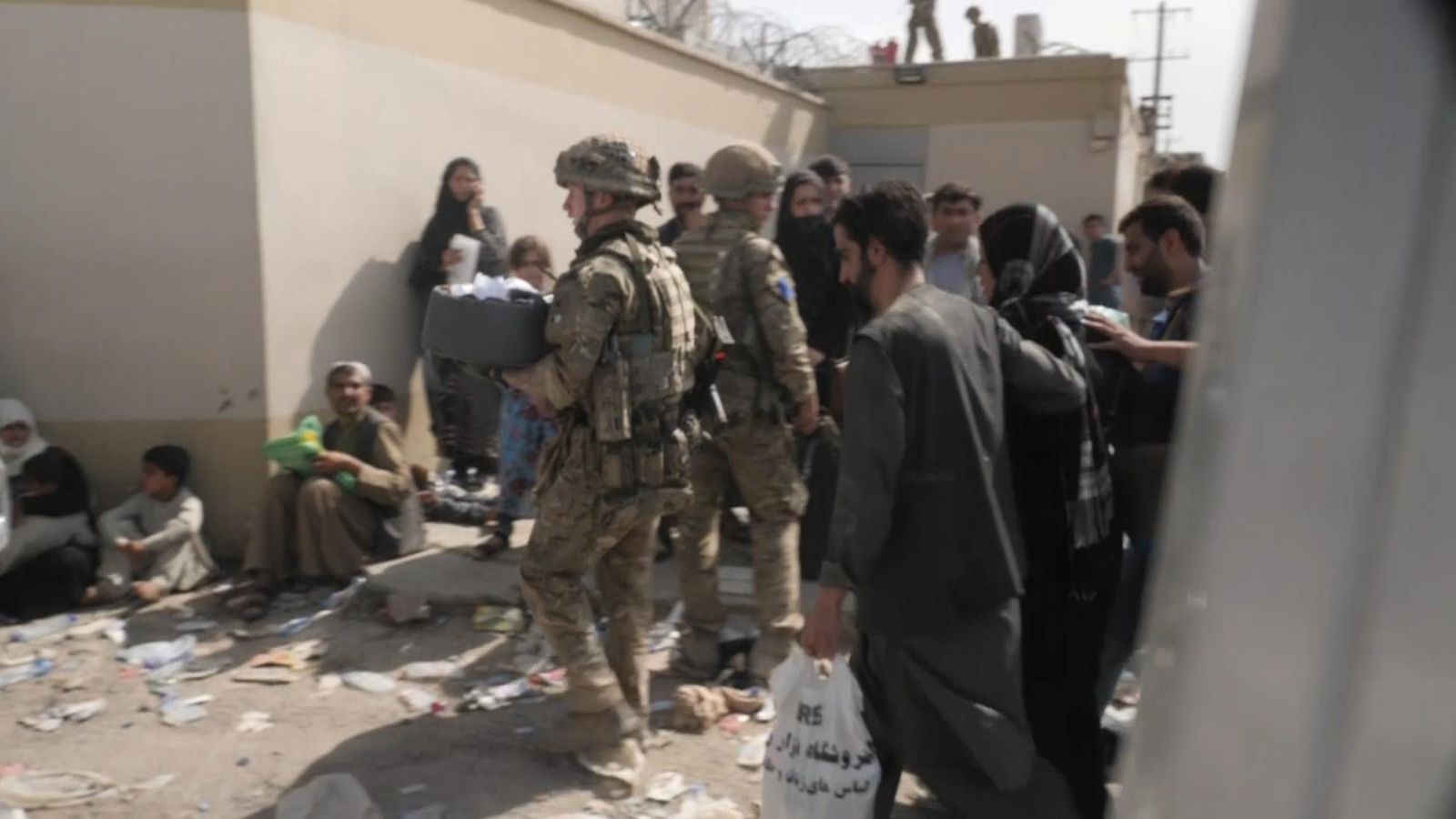 Afghanistan: British soldiers rush to aid baby in blistering heat at ...
