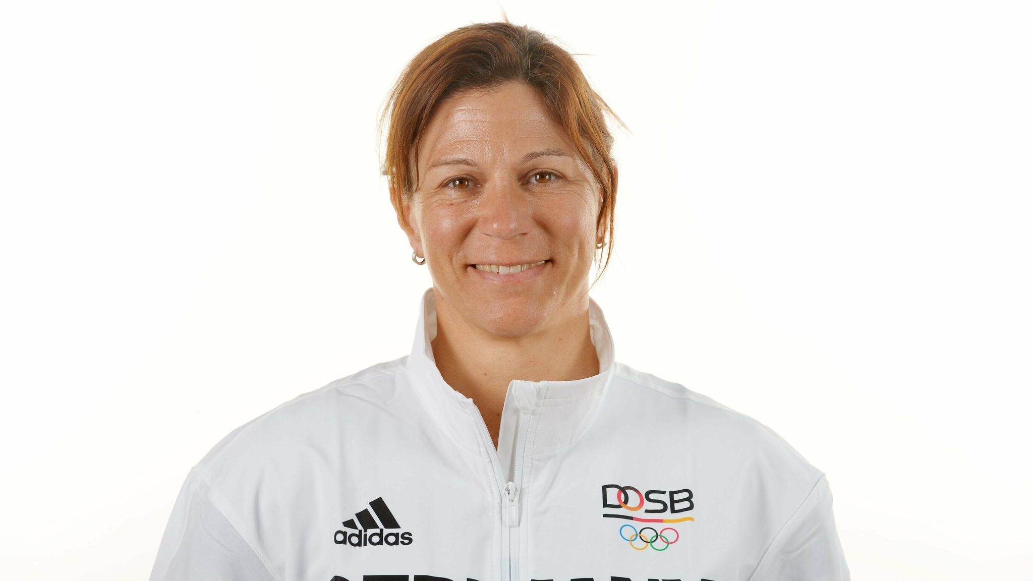 Coach kicked out of Tokyo Olympics after she punched horse that refused ...