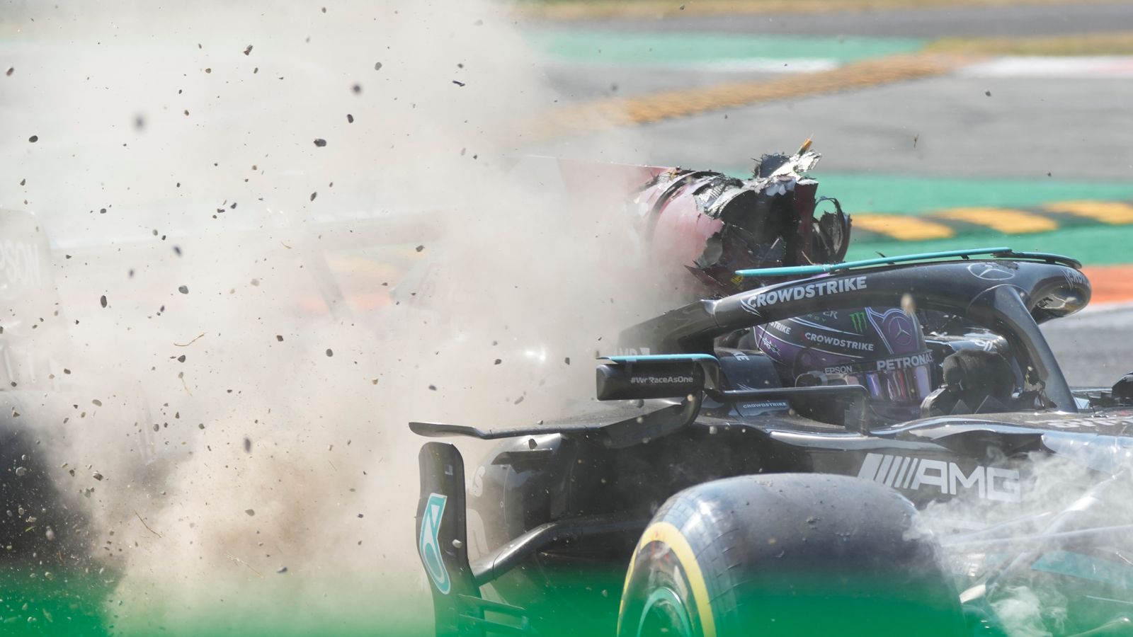 Lewis Hamilton 'sore but okay' after rival Max Verstappen's car landed ...