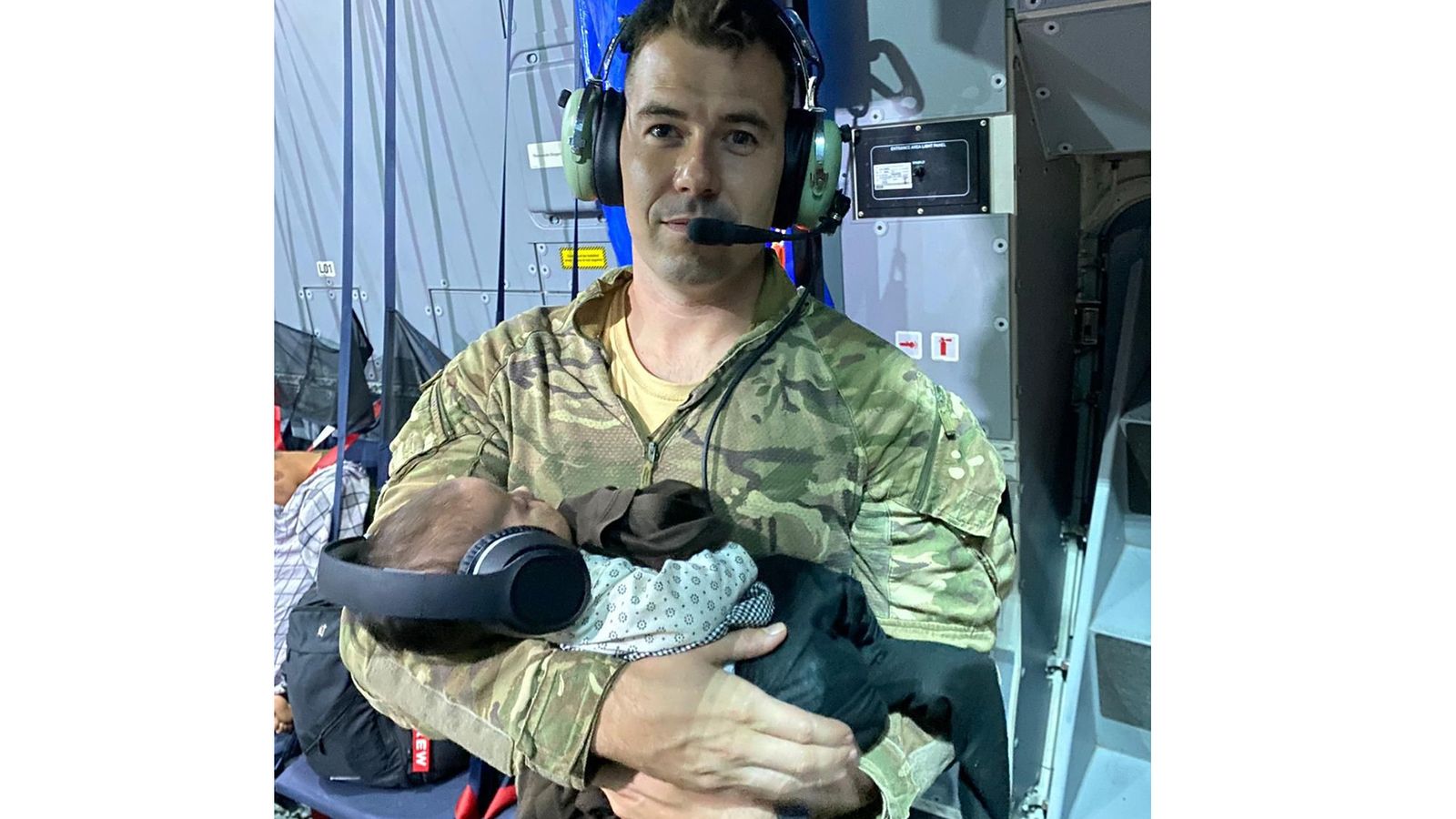 Afghanistan: RAF man cradled newborn dropped by exhausted mother on ...