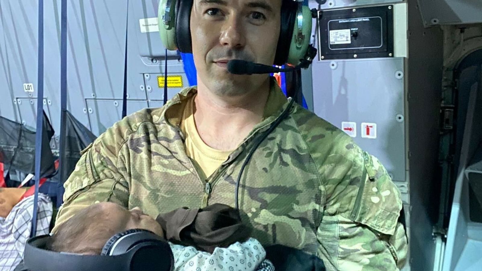 Afghanistan: RAF man cradled newborn dropped by exhausted mother on ...